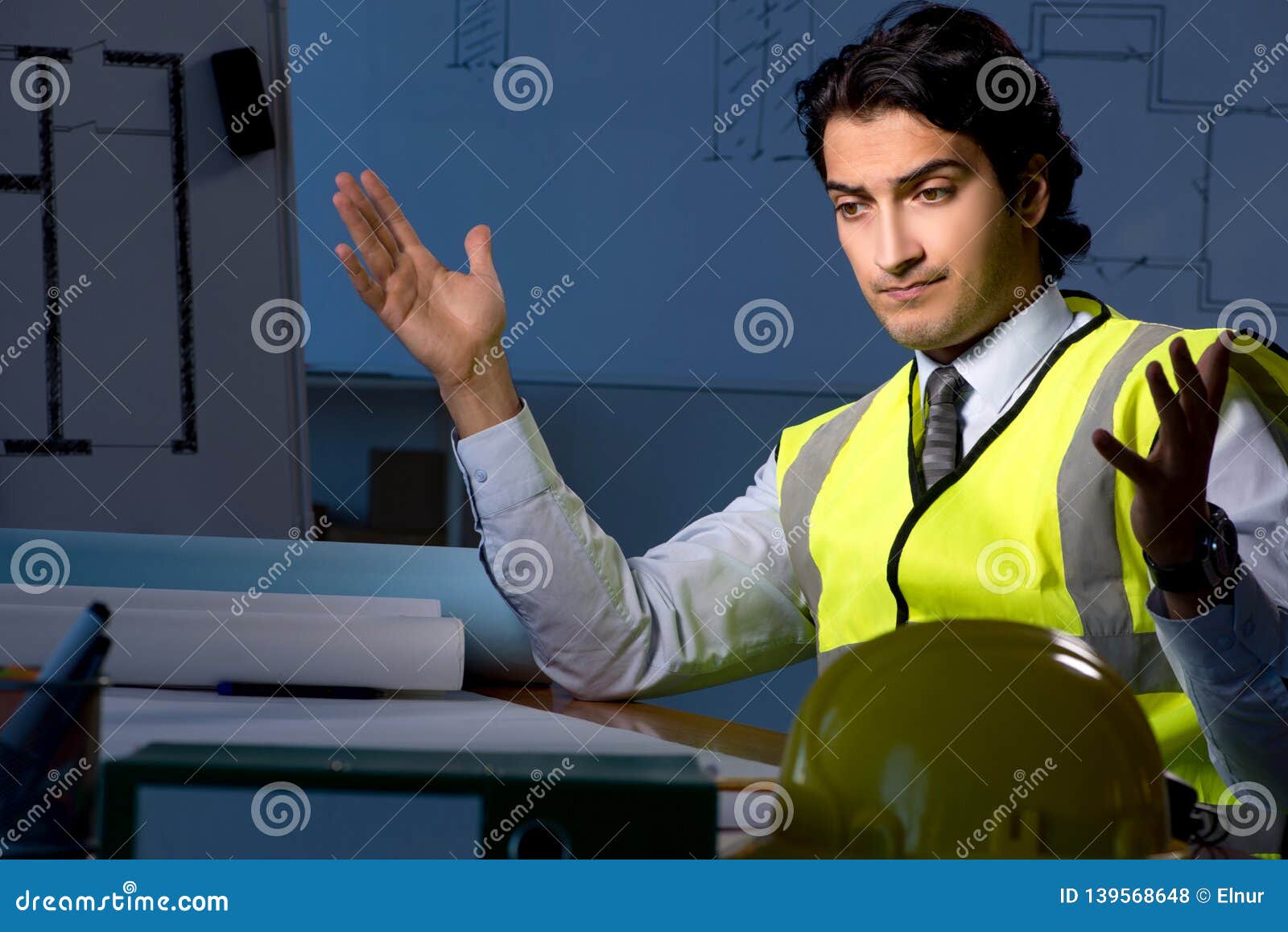 The Young Construction Architect Working on Project at Night Stock ...