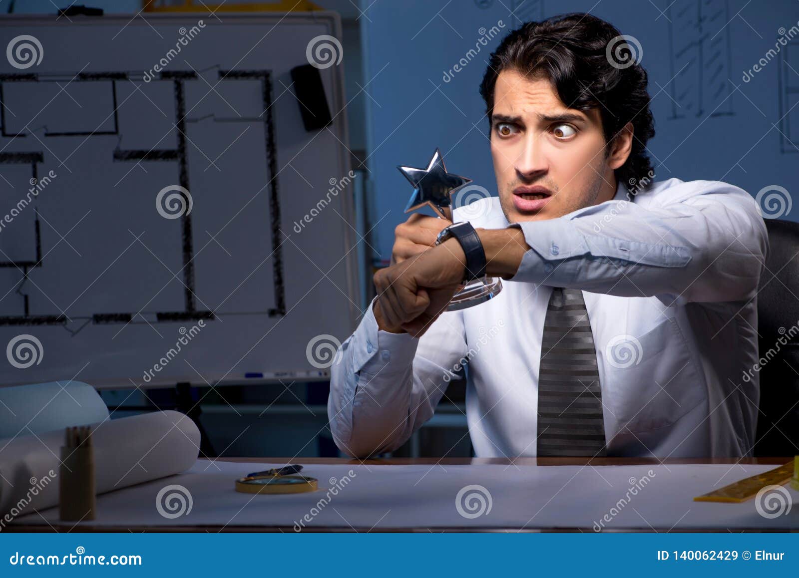 The Young Construction Architect Working on Project at Night Stock ...