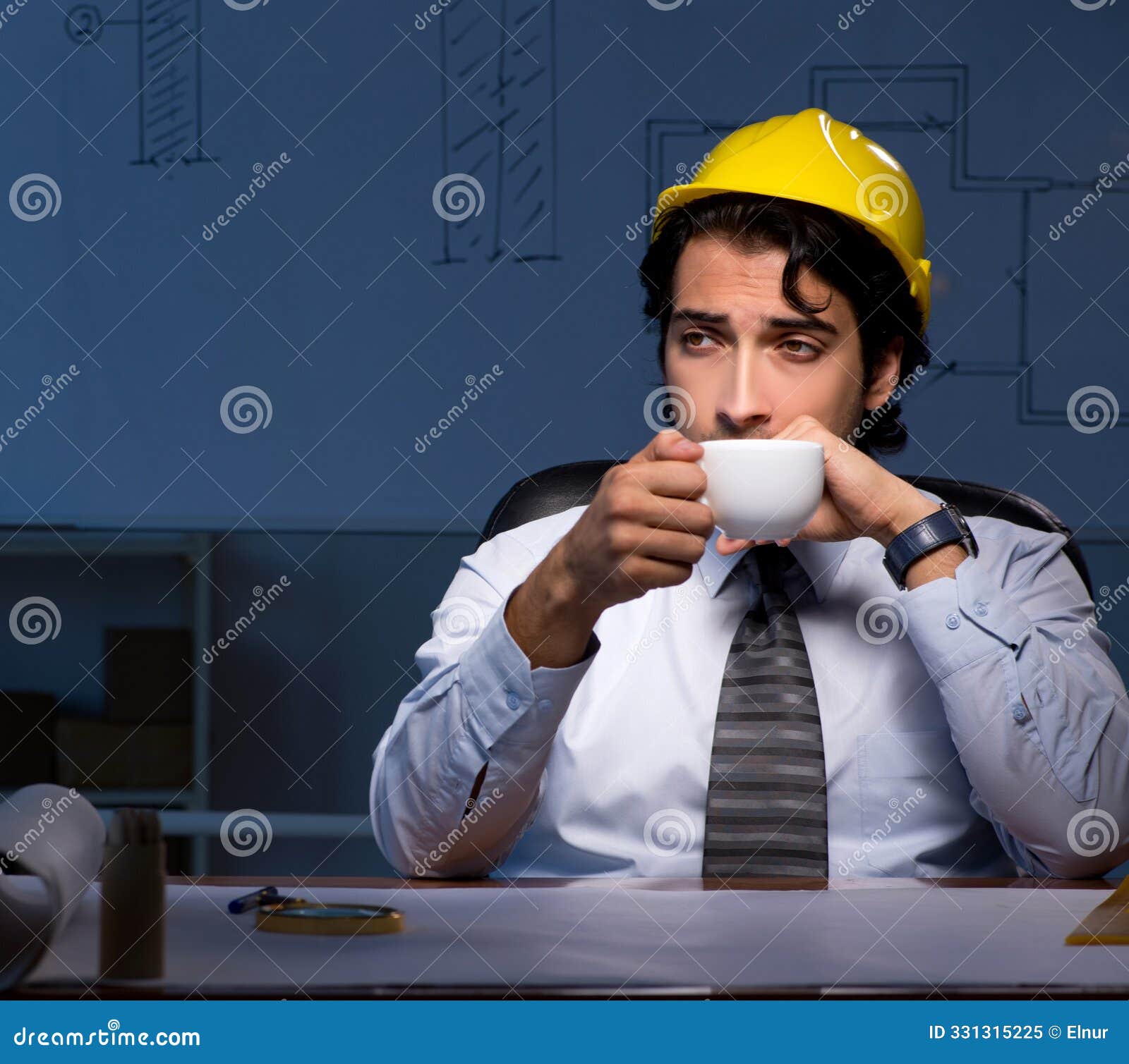 Young Construction Architect Working on Project at Night Stock Image ...