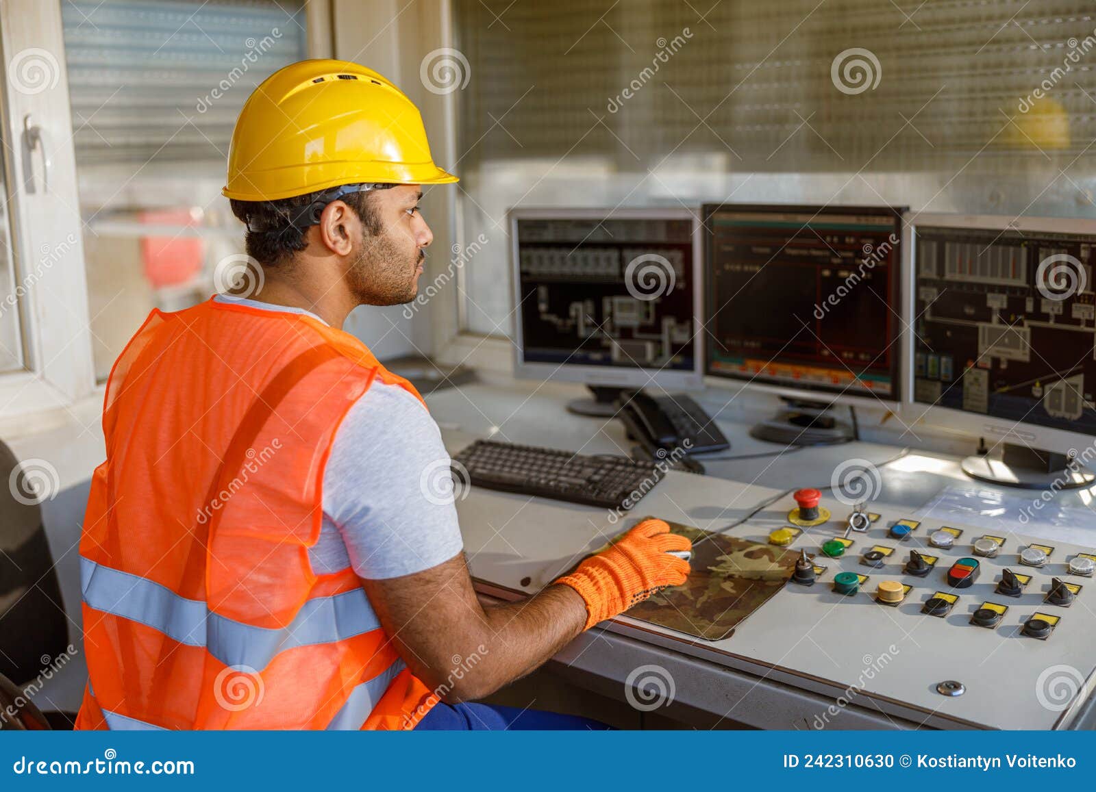 Young Multiethnic Operator Working at Concrete Plant Stock Photo ...