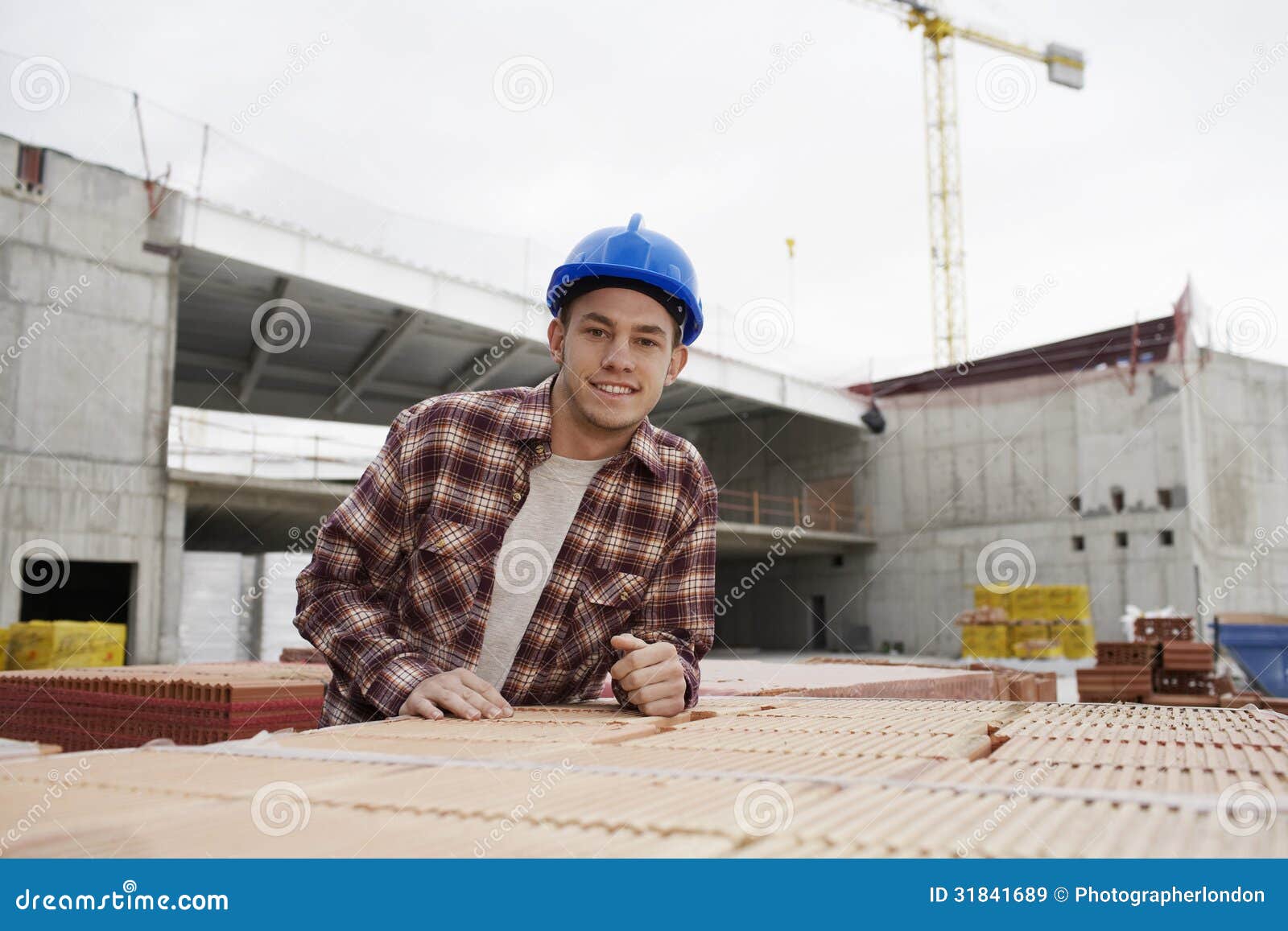 The Young Worker With Safety Helmet Hardhat Stock Photography ...