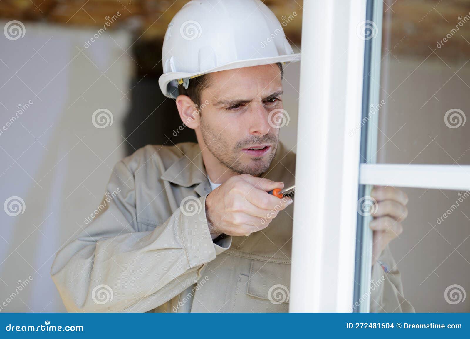 Young Construction Worker Fitting Window Stock Photo - Image of tool, indoor: 272481604