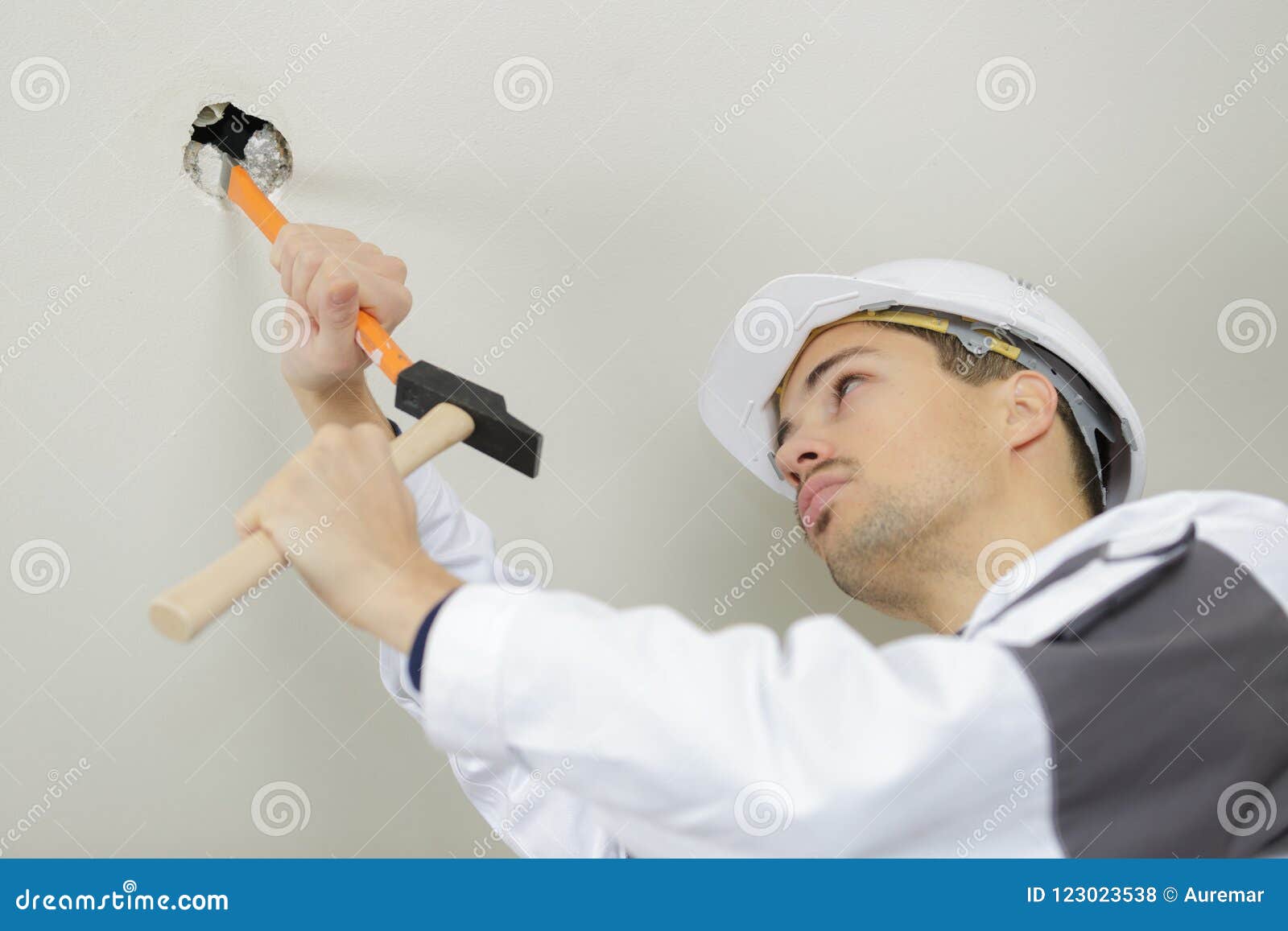Young Construction Worker with Hammer Stock Photo - Image of connection ...