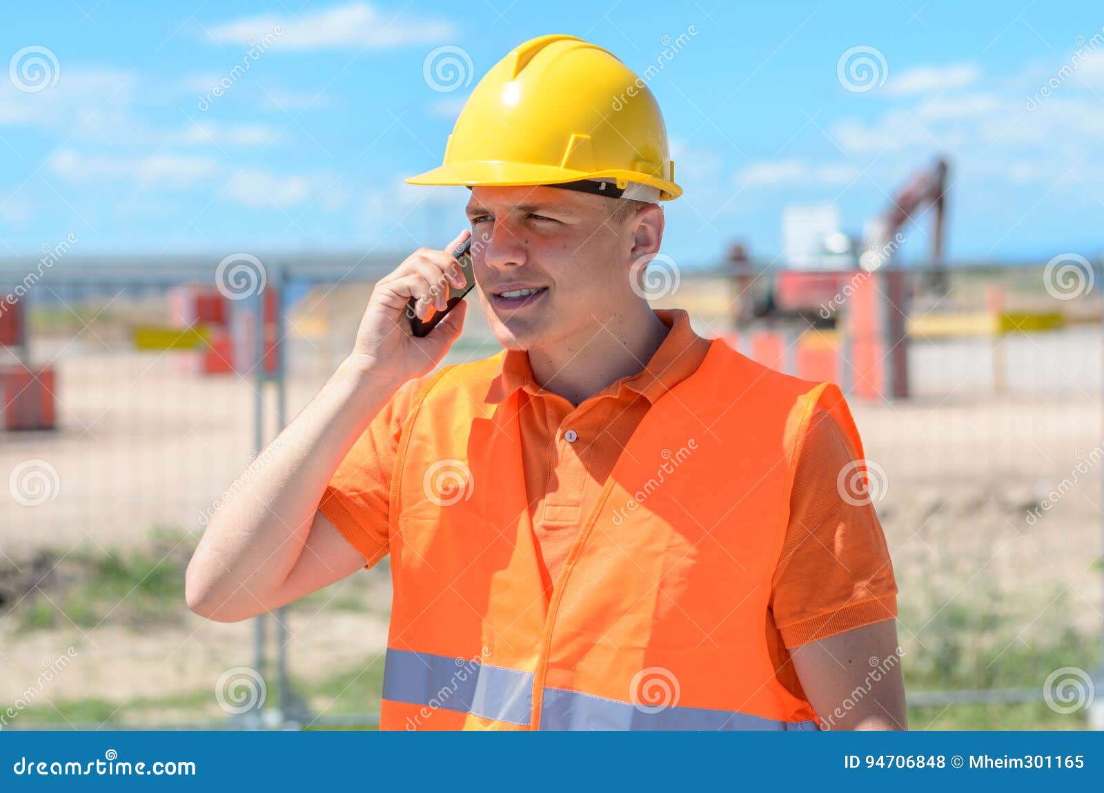 Young Construction Worker Talking on a Mobile Stock Photo - Image of ...