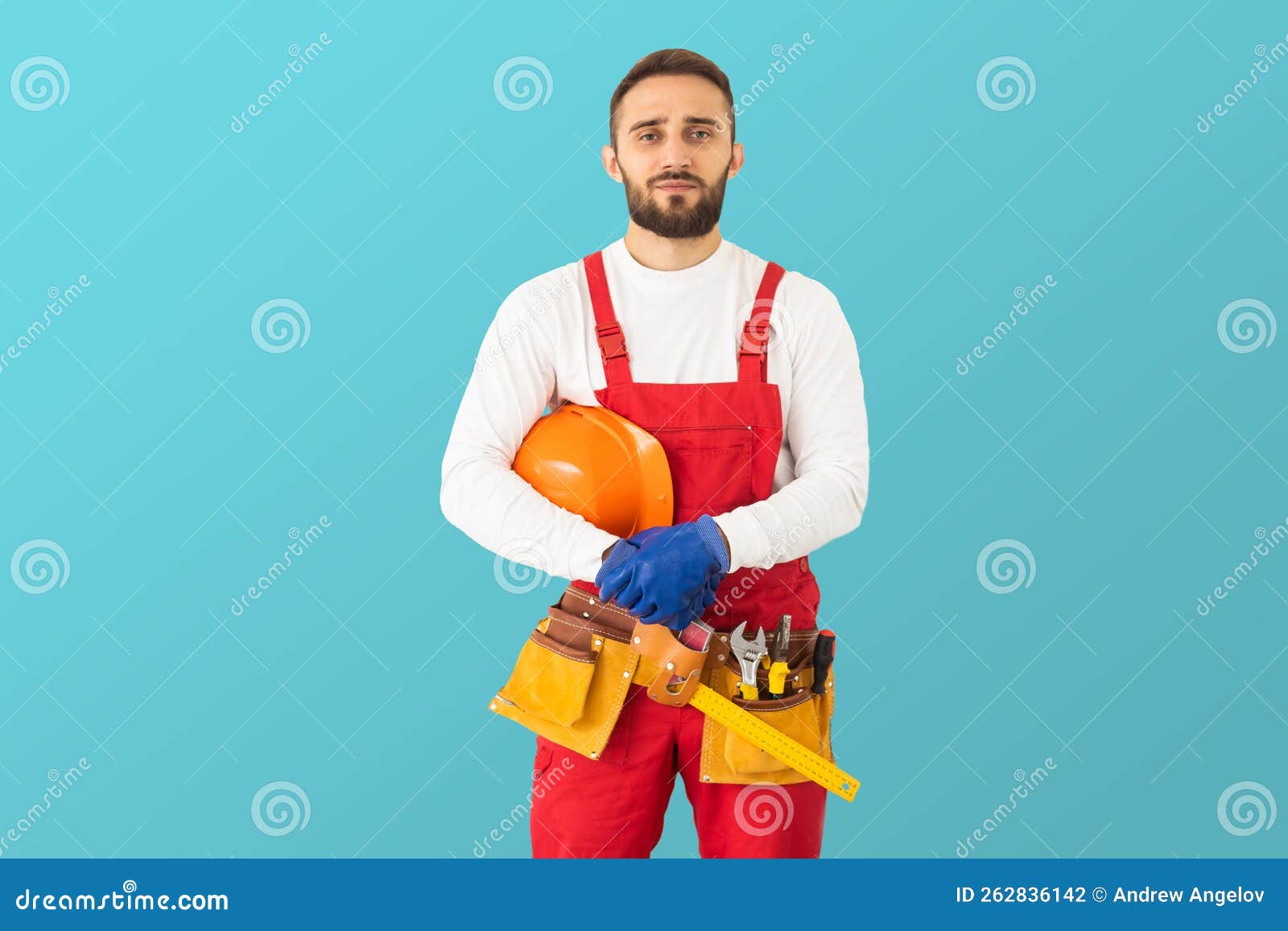 Young Construction Workers on a Colored Background Stock Photo - Image ...