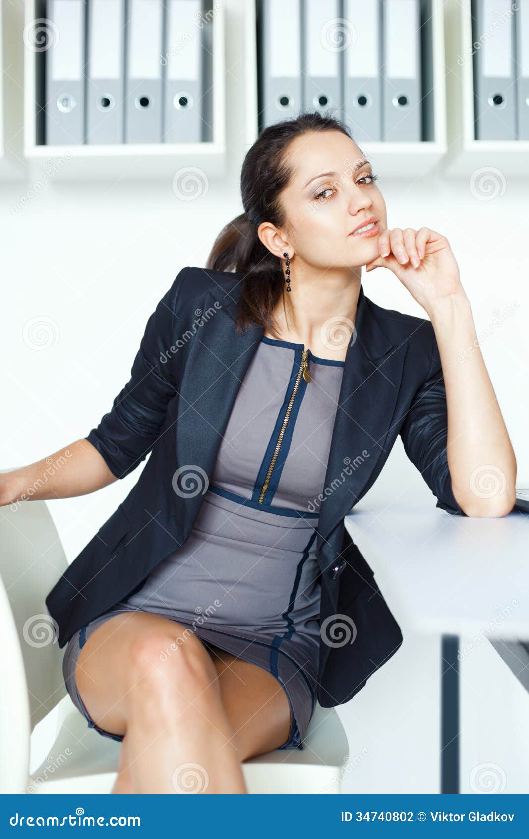 Young Business Woman Sitting At Desk At Office Royalty-Free Stock Photo ... Young Business Woman Sitting At Desk At Office Royalty-Free Stock Photo ...