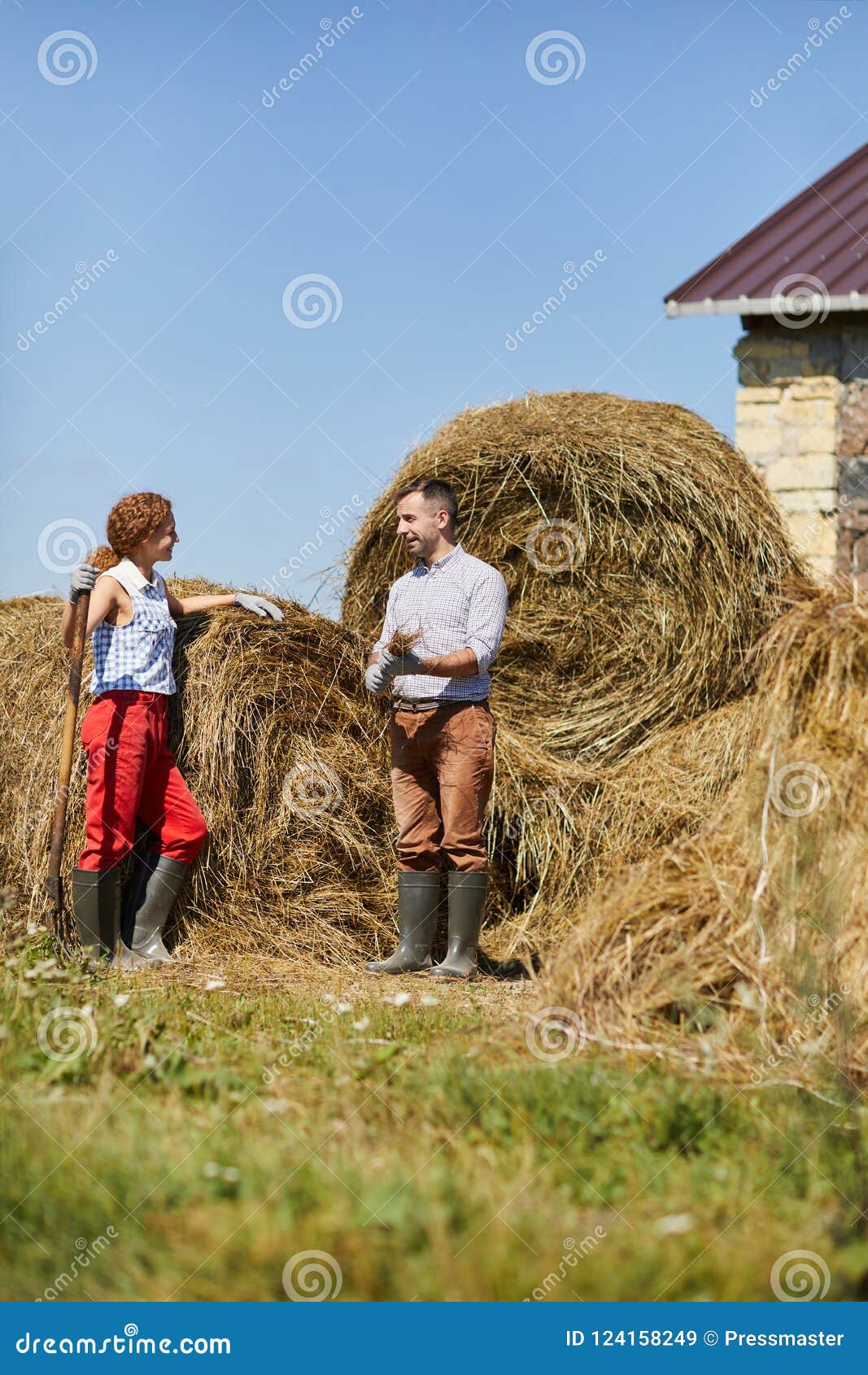 Farmers by hay stack stock image. Image of country, woman - 124158249