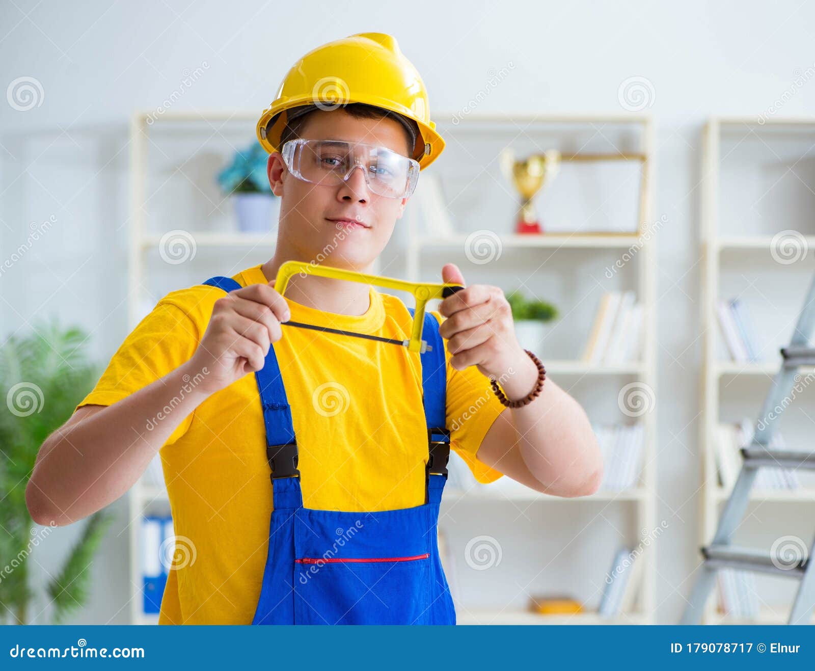 Young Contractor Doing Repair Works at Office Stock Image - Image of ...