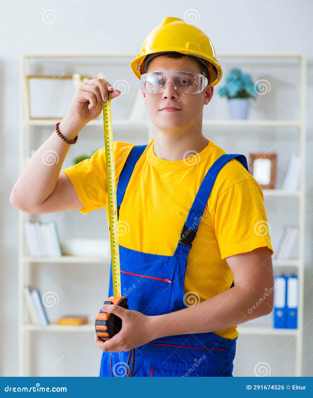 Young Contractor Doing Repair Works at Office Stock Photo - Image of ... Young Contractor Doing Repair Works at Office Stock Photo - Image of ...