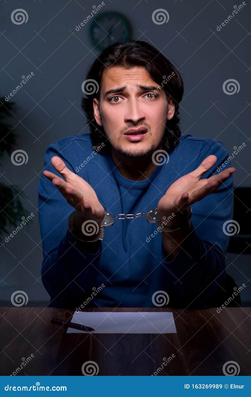 Young Convict Man Sitting in Dark Room Stock Image - Image of arrest ...