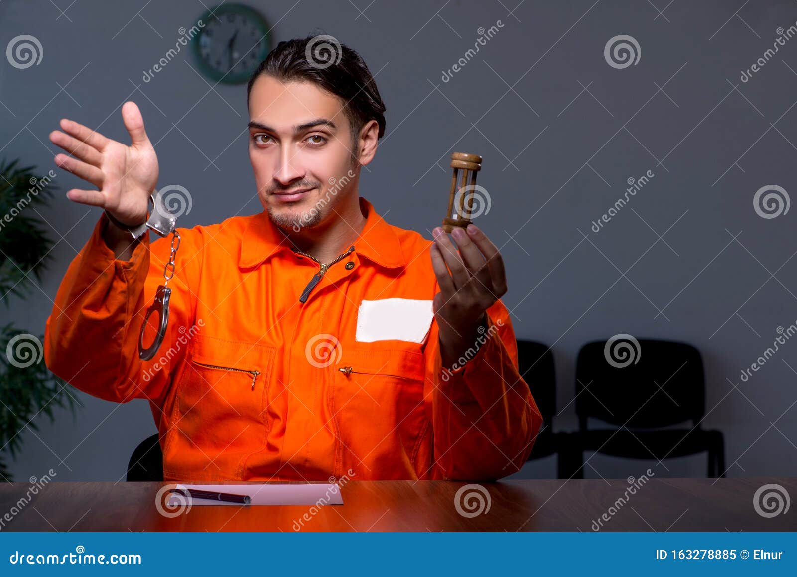 Young Convict Man Sitting in Dark Room Stock Image - Image of illegal ...