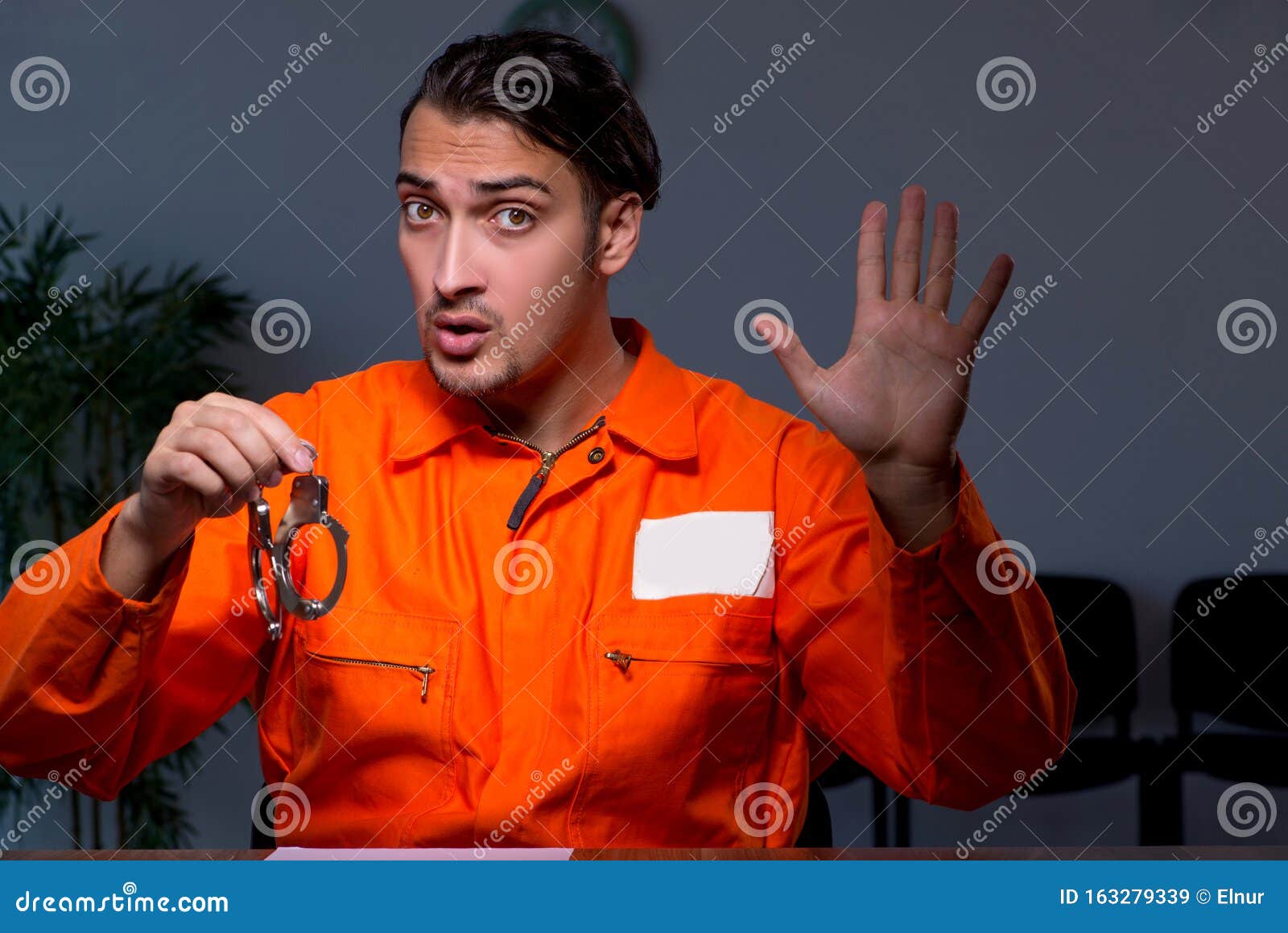 Young Convict Man Sitting in Dark Room Stock Image - Image of cuff ...