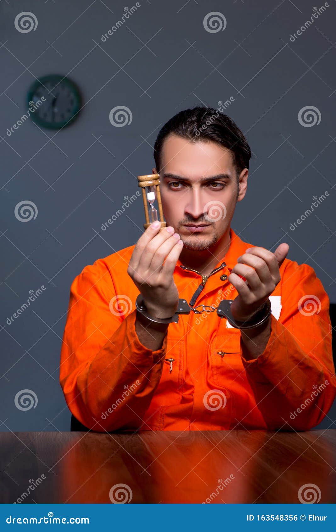 Young Convict Man Sitting in Dark Room Stock Photo - Image of detention ...