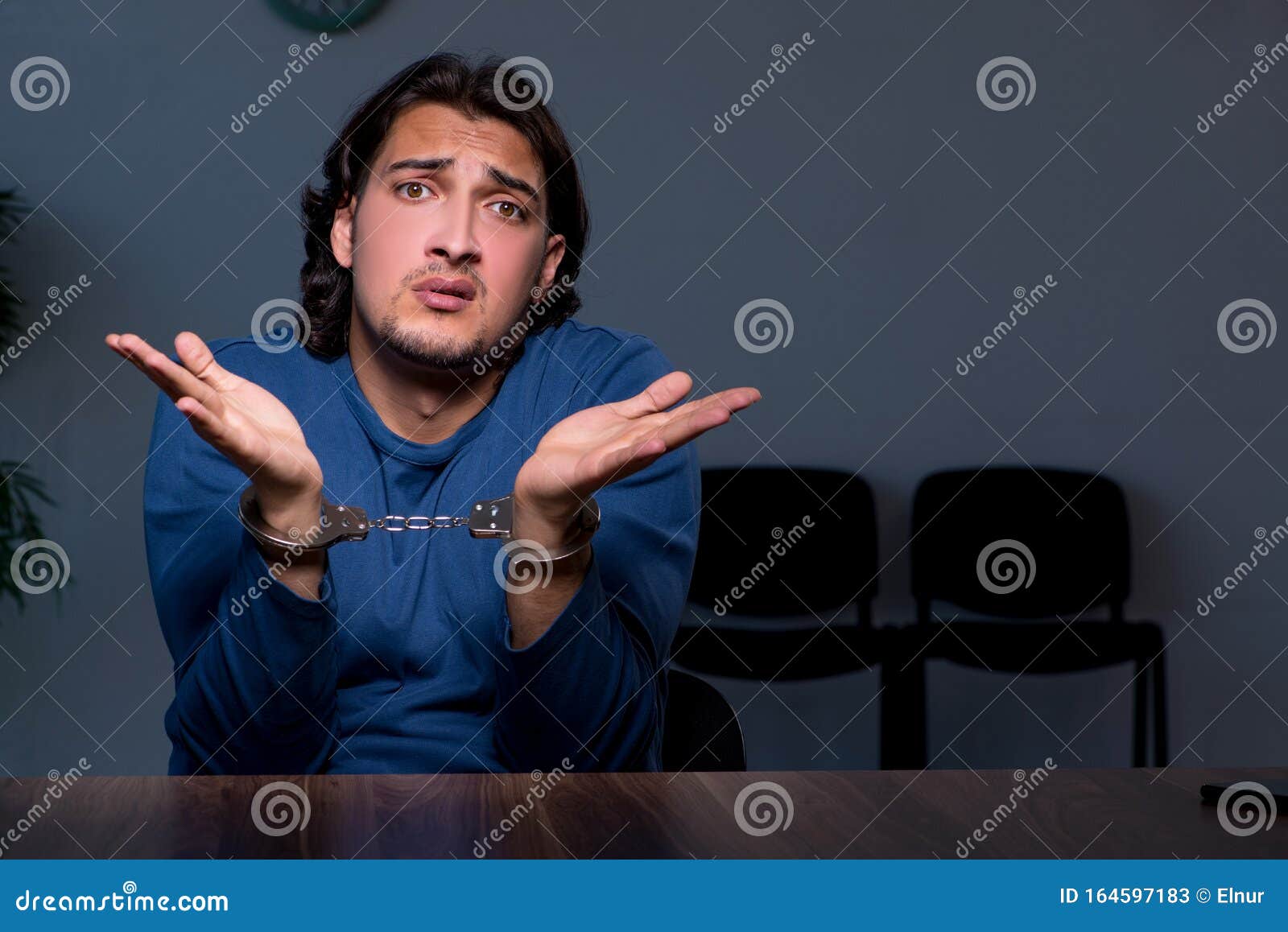 Young Convict Man Sitting in Dark Room Stock Image - Image of convict ...