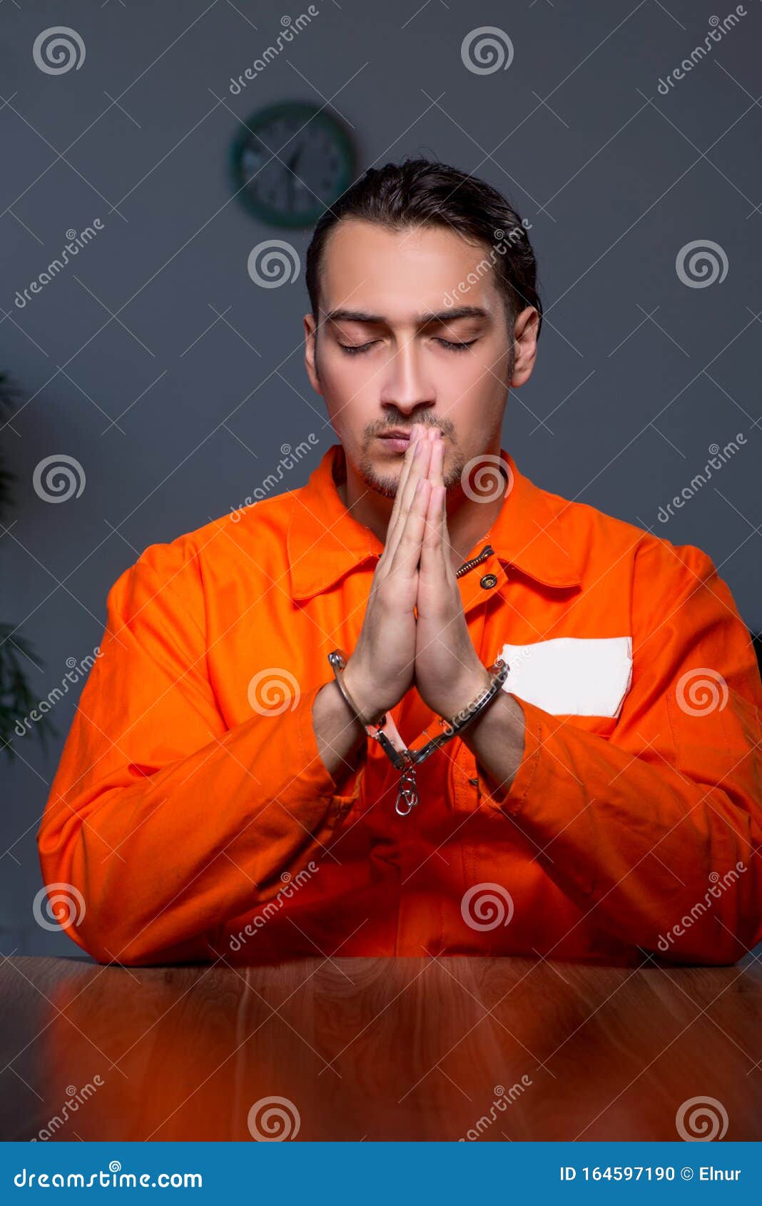 Young Convict Man Sitting in Dark Room Stock Photo - Image of detention ...