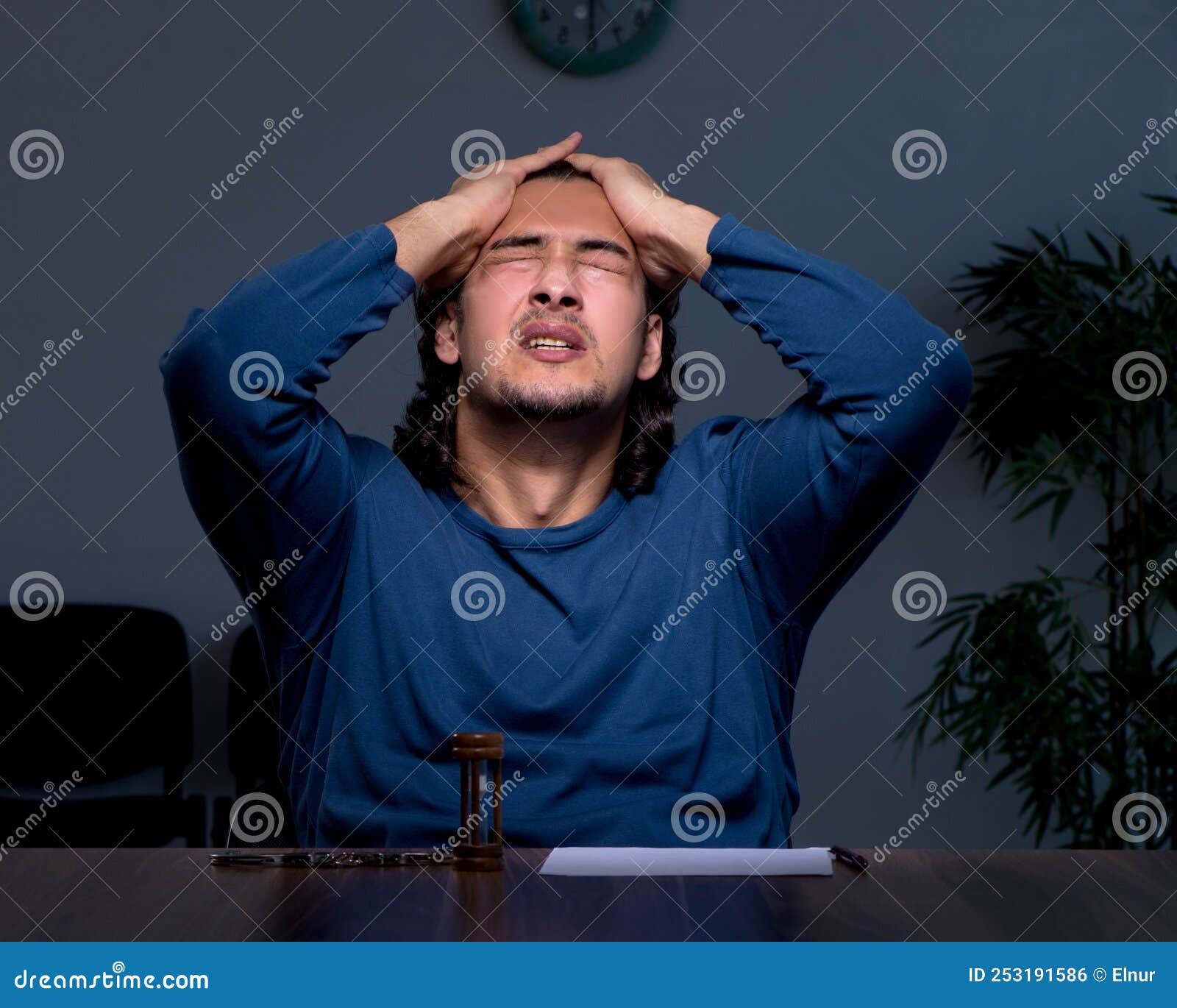 Young Convict Man Sitting in Dark Room Stock Photo - Image of lock ...