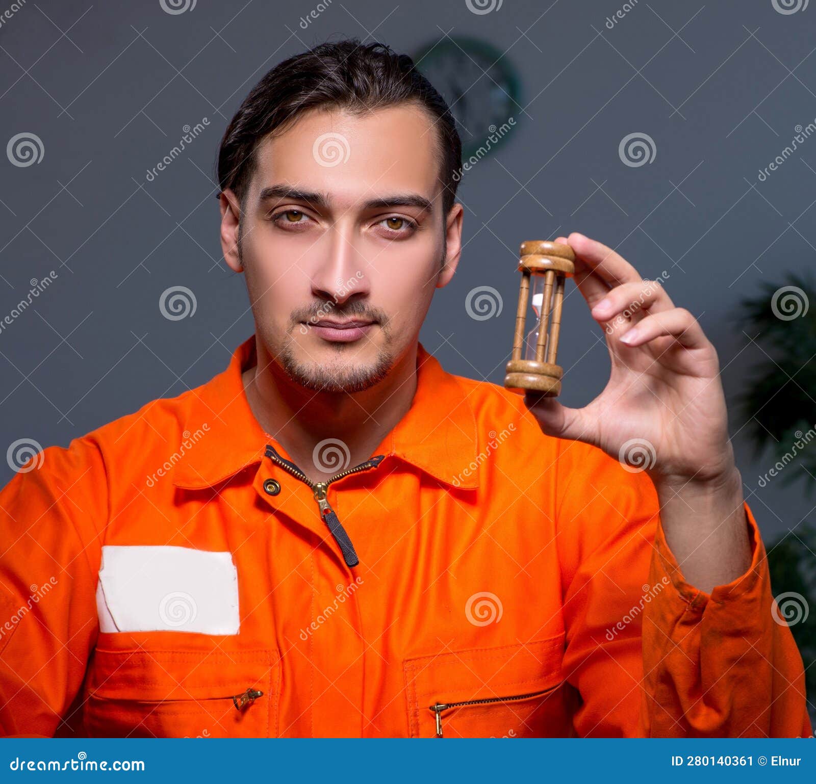 Young Convict Man Sitting in Dark Room Stock Image - Image of clock ...