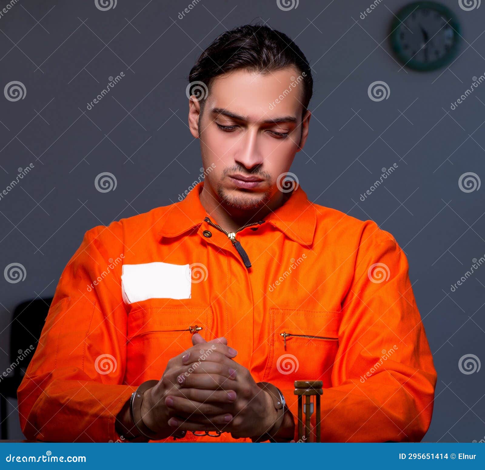 Young Convict Man Sitting in Dark Room Stock Photo - Image of hand ...