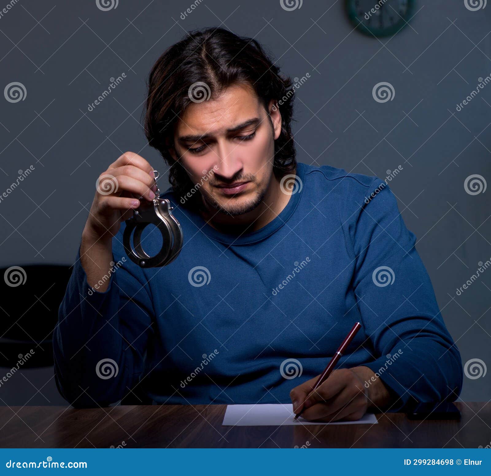 Young Convict Man Sitting in Dark Room Stock Photo - Image of detaining ...