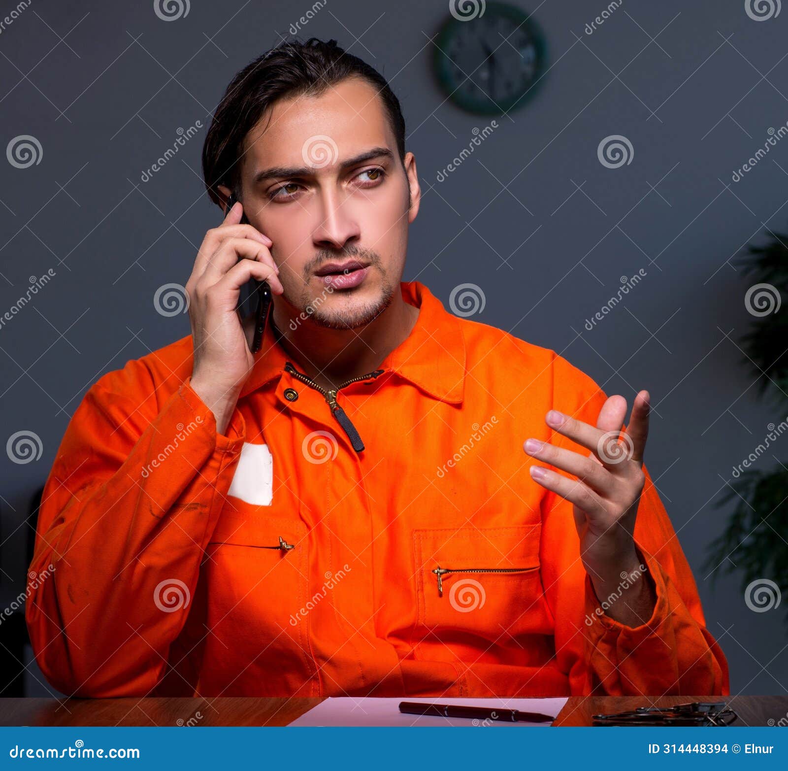 Young Convict Man Sitting in Dark Room Stock Photo - Image of barrister ...