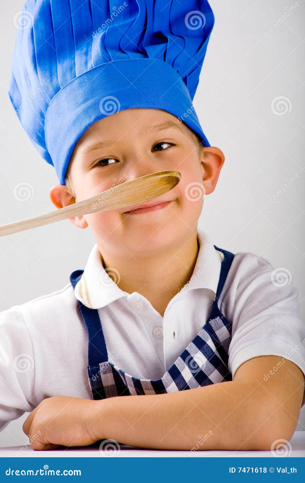 Young cook stock photo. Image of apron, fish, home, gourmet - 7471618