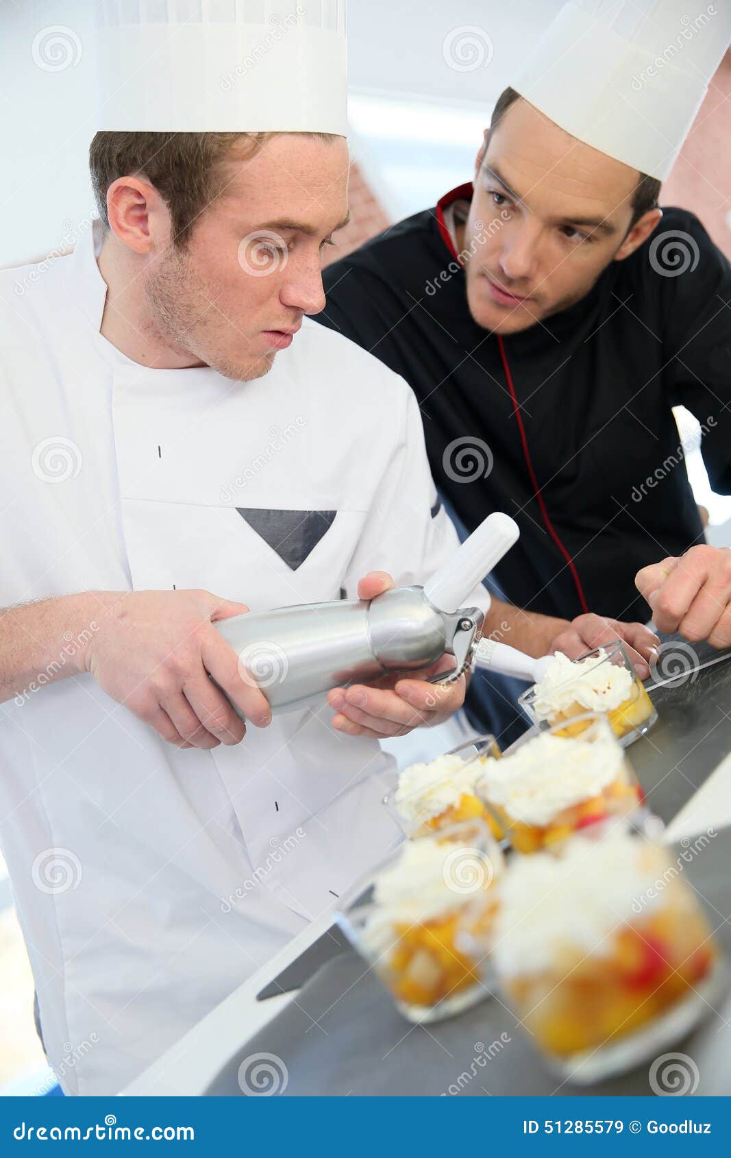 Young Cook with Cooking Chef Preparing Dessert Stock Image - Image of ...