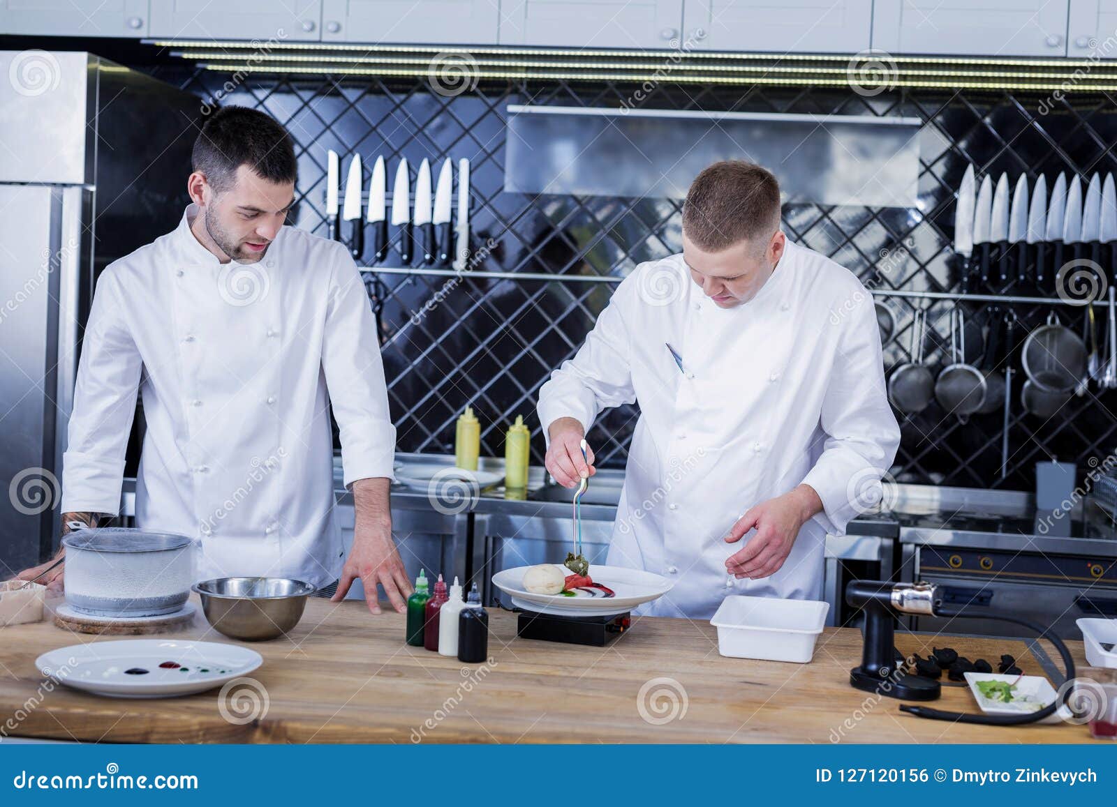 Young Cooks Working in the Kitchen Together Stock Photo - Image of cook ...