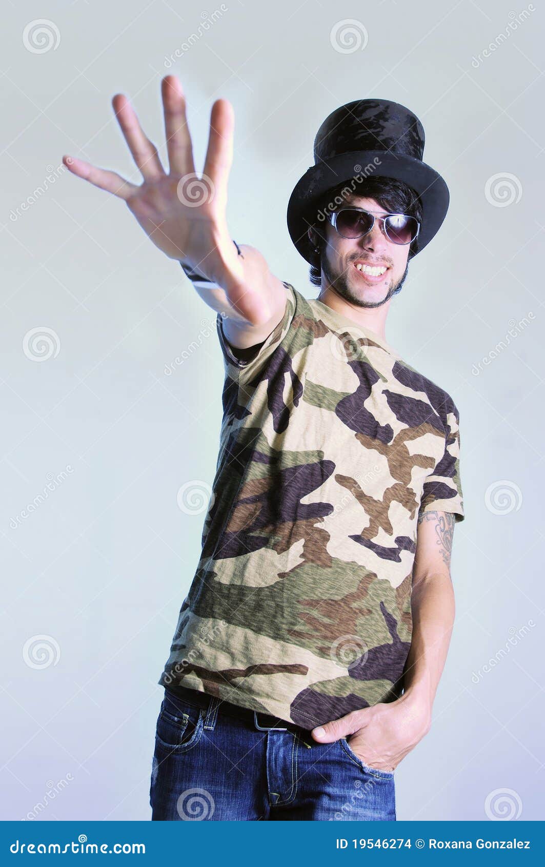 Young cool guy wearing hat stock photo. Image of gesture - 19546274