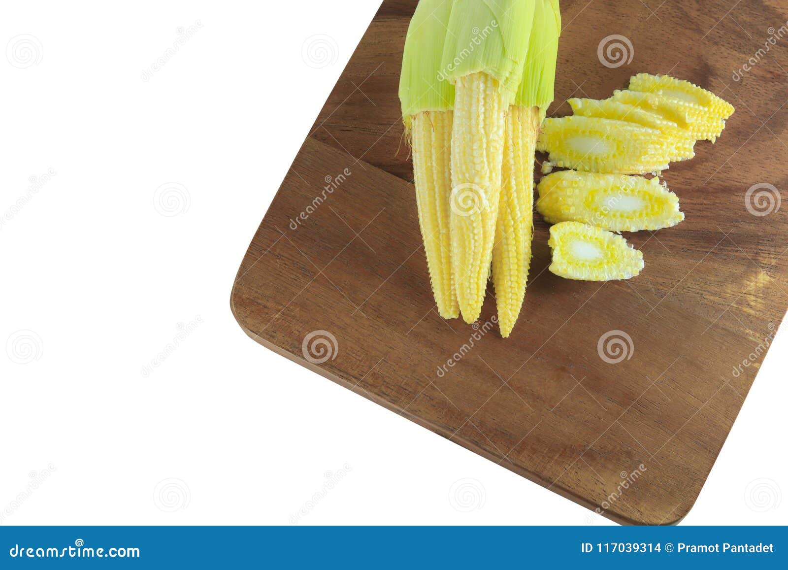 Young Corn Small. And Sliced Slice On Chopping Board. White Background ...