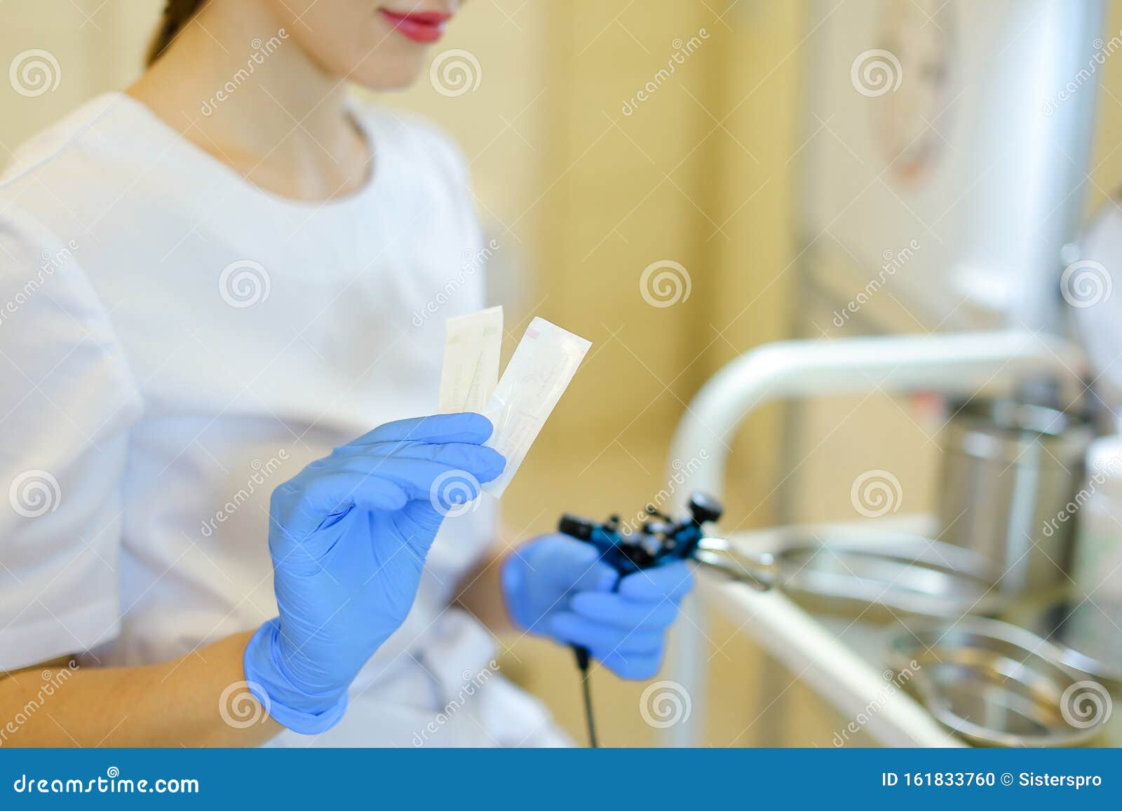 Young Cosmetologist Inserting Needle into Microblading Device. Stock ...