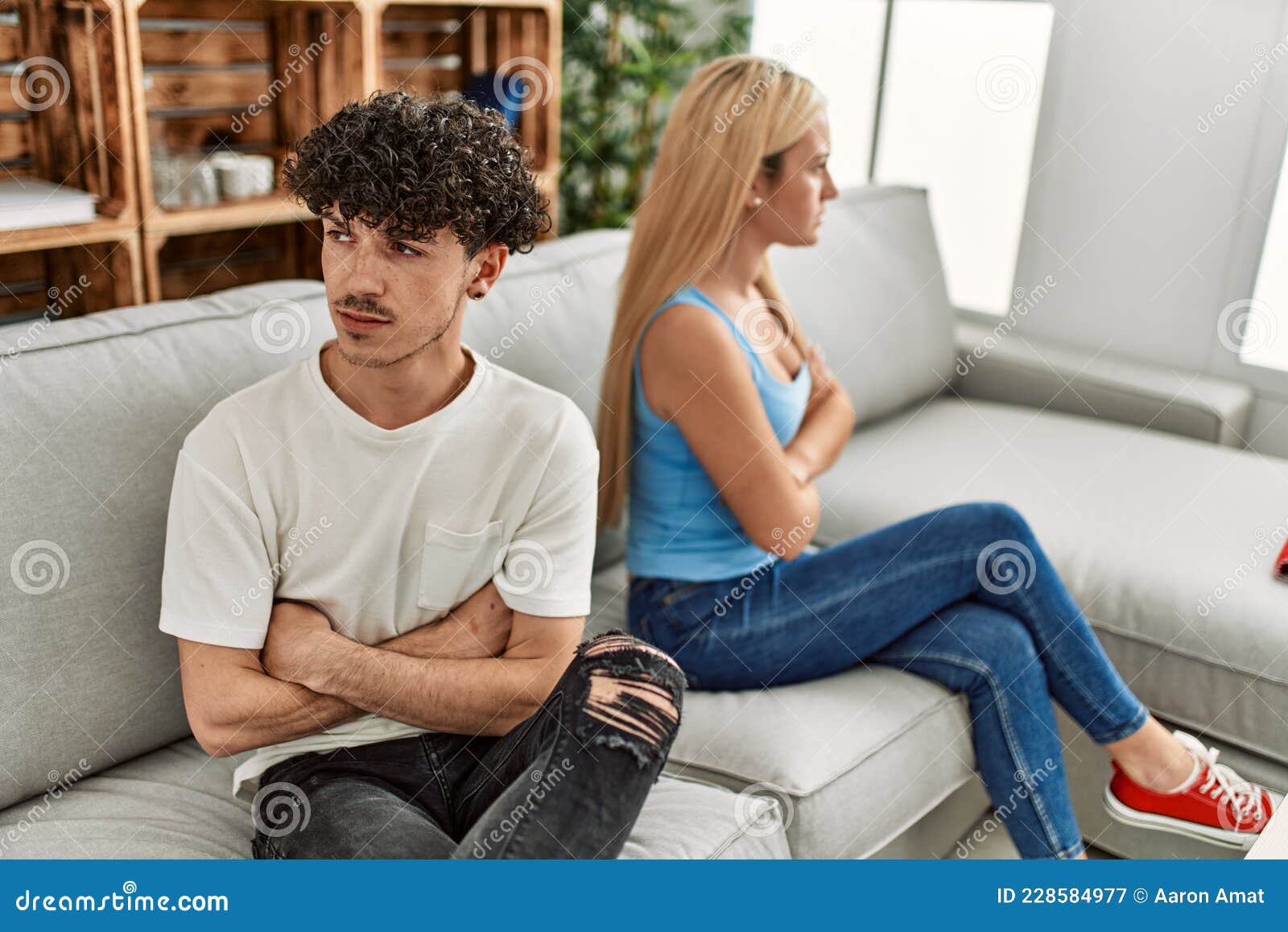 Young Couple Angry Sitting on the Sofa in Silence at Home Stock Image ...