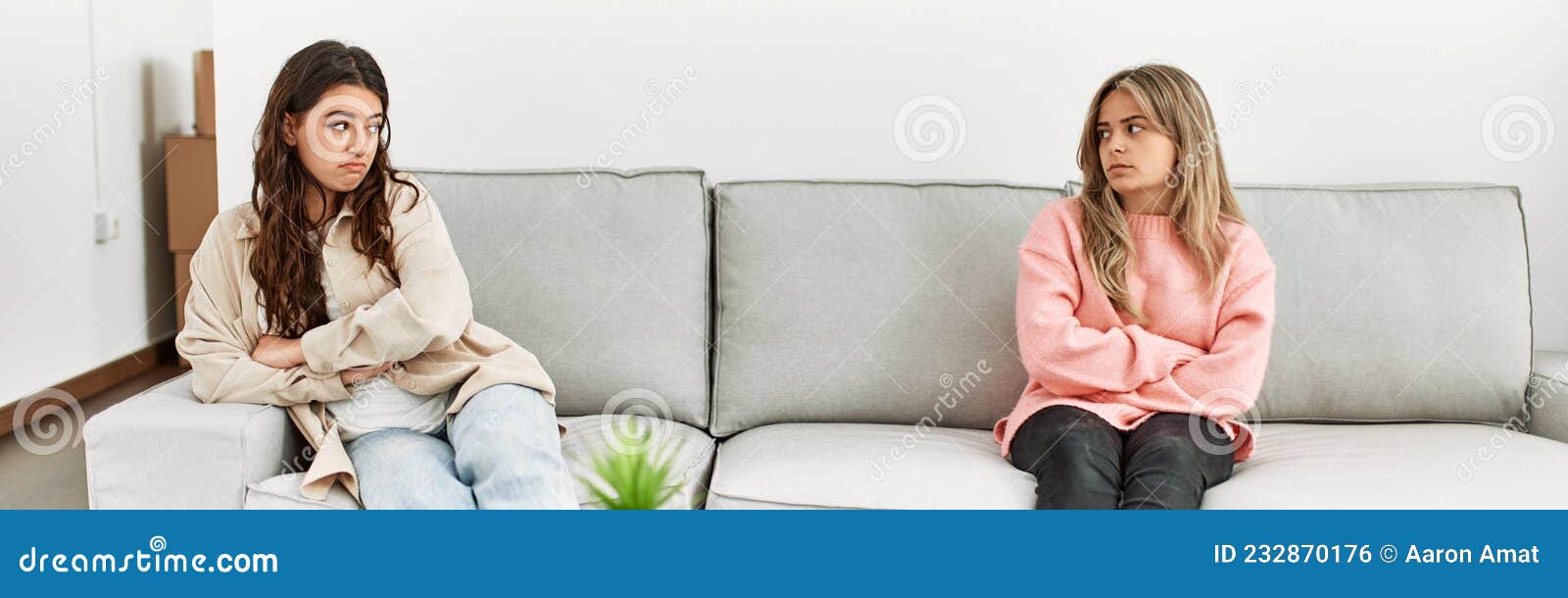 Young Couple Angry Sitting on the Sofa in Silence at Home Stock Photo ...