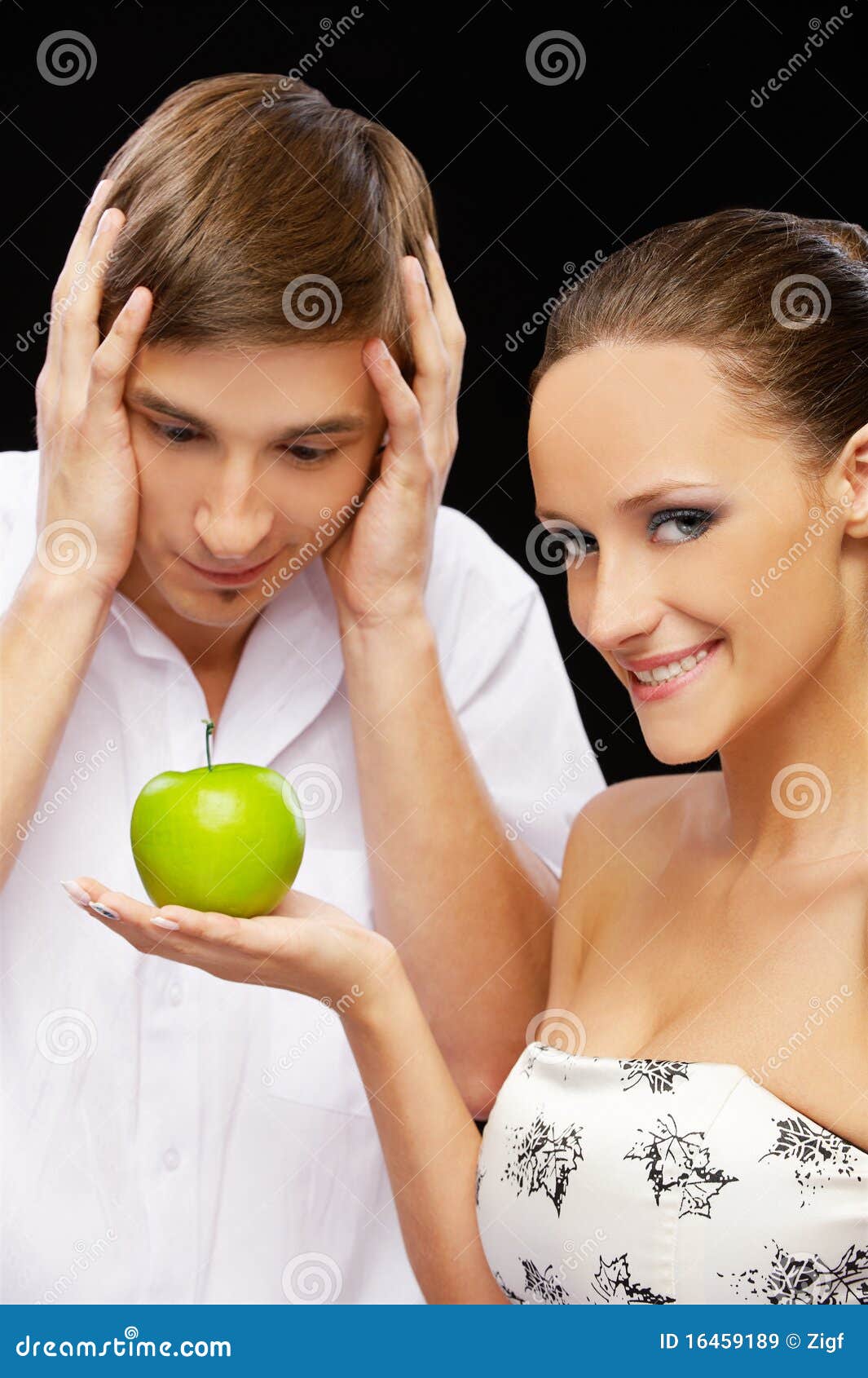 Young couple with apple stock image. Image of calories - 16459189