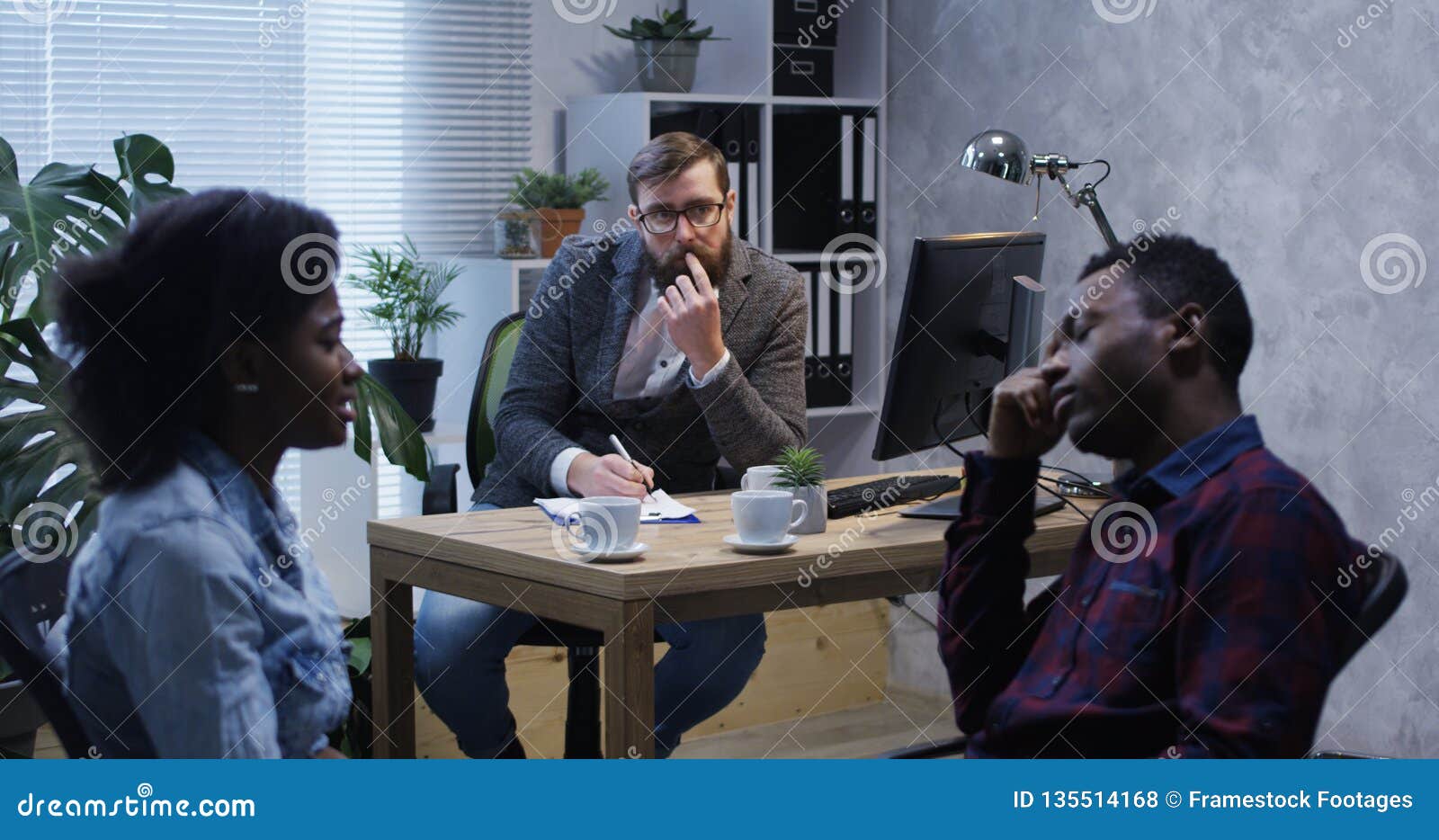 Young Couple Arguing in the Office of a Psychologist Stock Photo ...