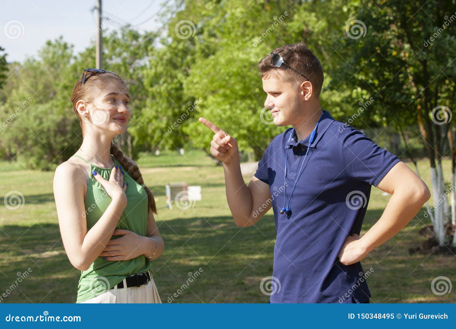 Young Couple Arguing while Sitting on Bench in Park. Problems in ...