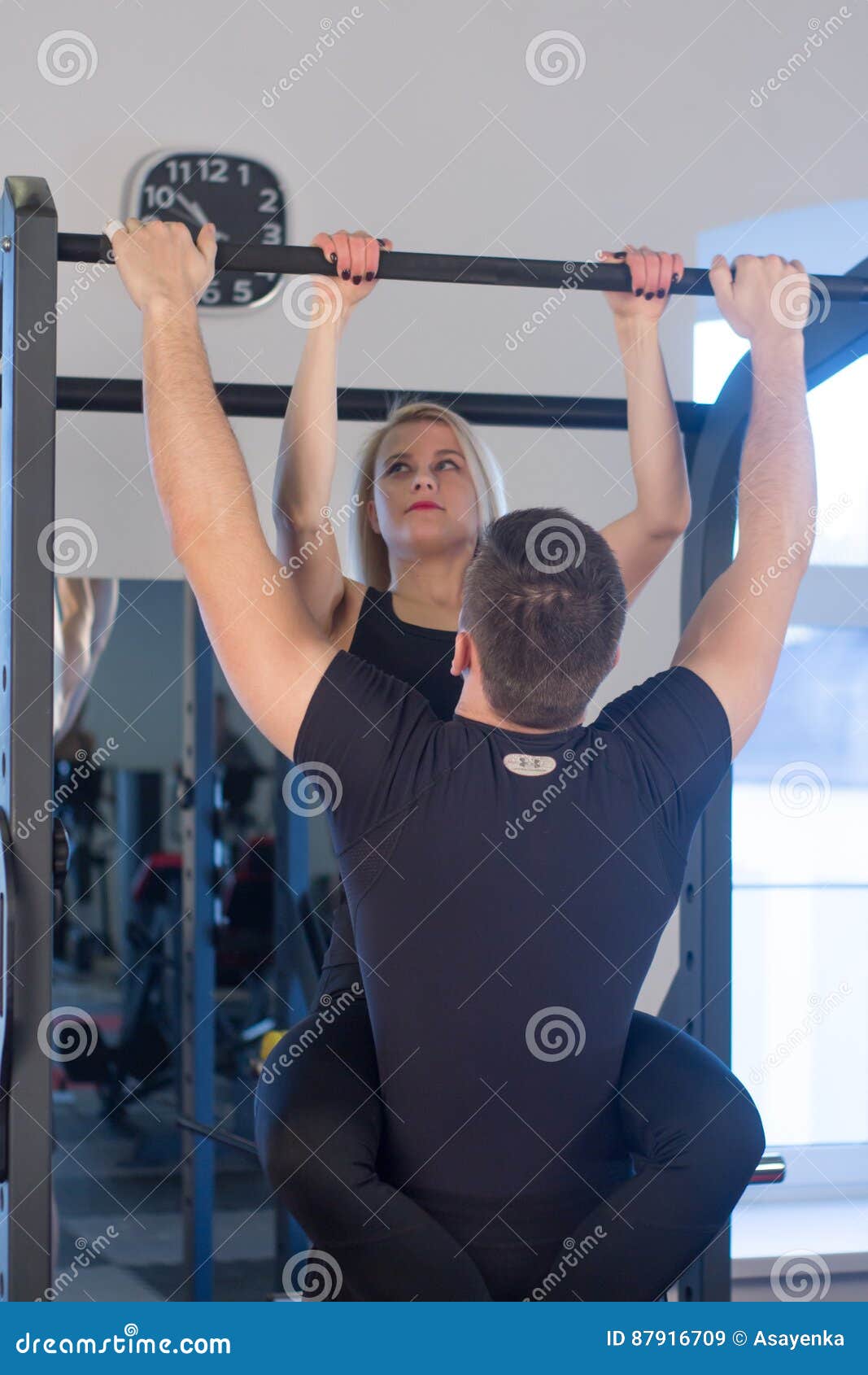 Young Couple Athlete Doing Pull Ups Training Back Together Stock Image ...