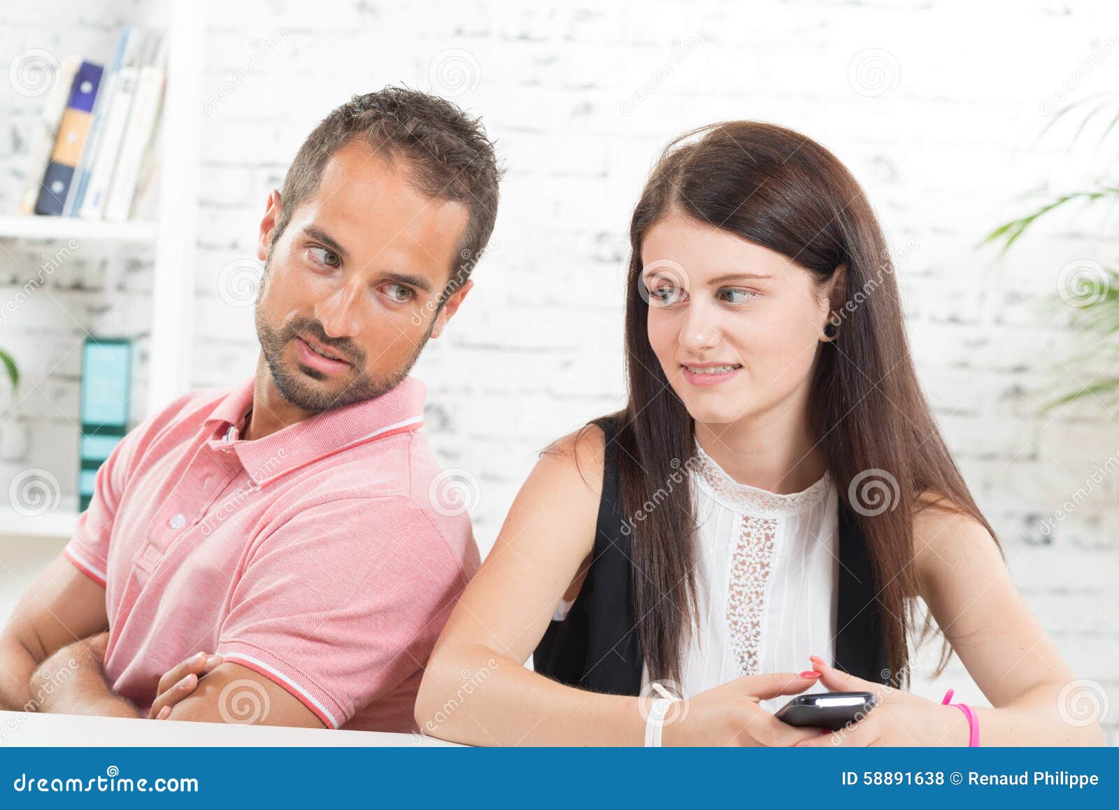 Young couple back to back stock photo. Image of smile - 58891638