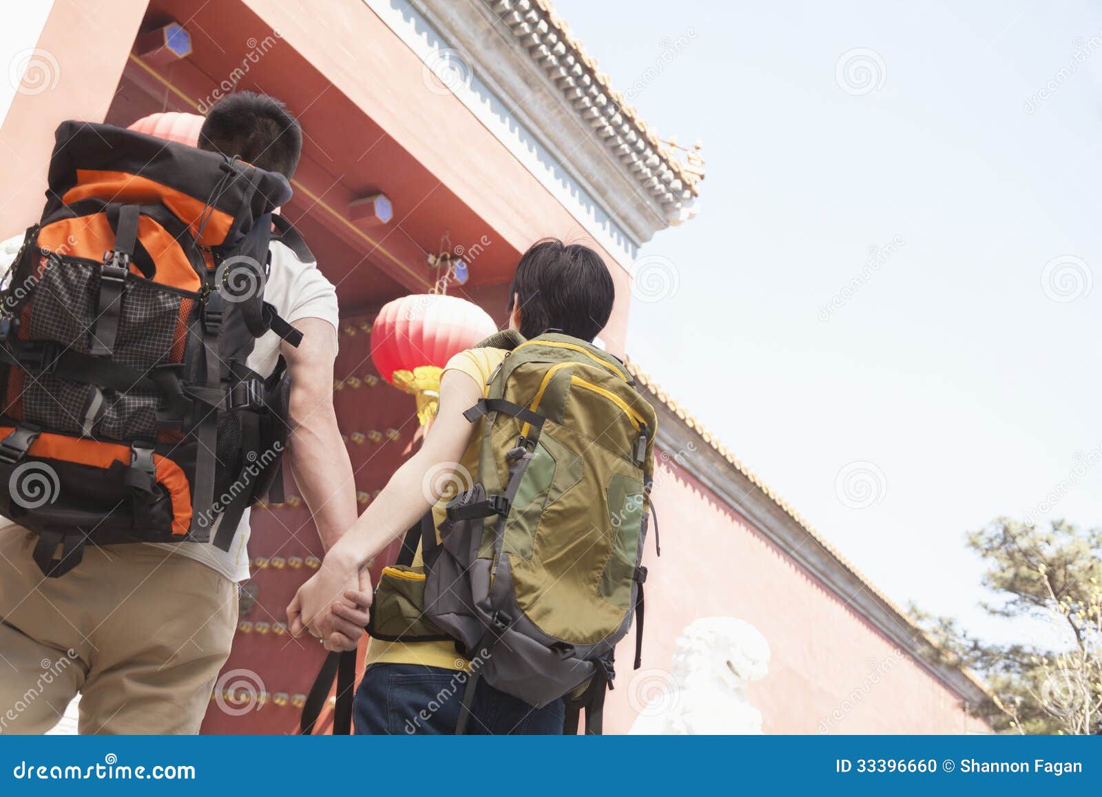 Young Couple with Backpacks, Holding Hands. Stock Photo - Image of ...