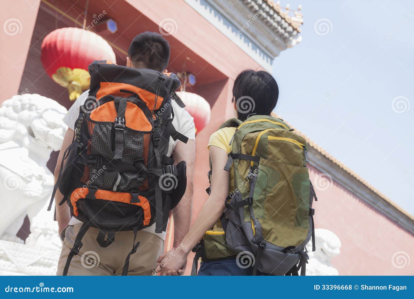 Young Couple with Backpacks, Holding Hands. Stock Photo - Image of ...