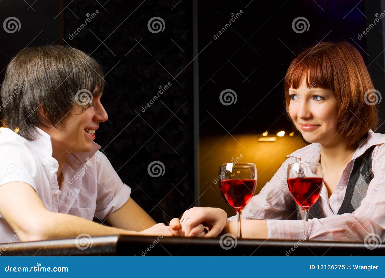 Young couple in a bar. stock image. Image of hands, cute - 13136275