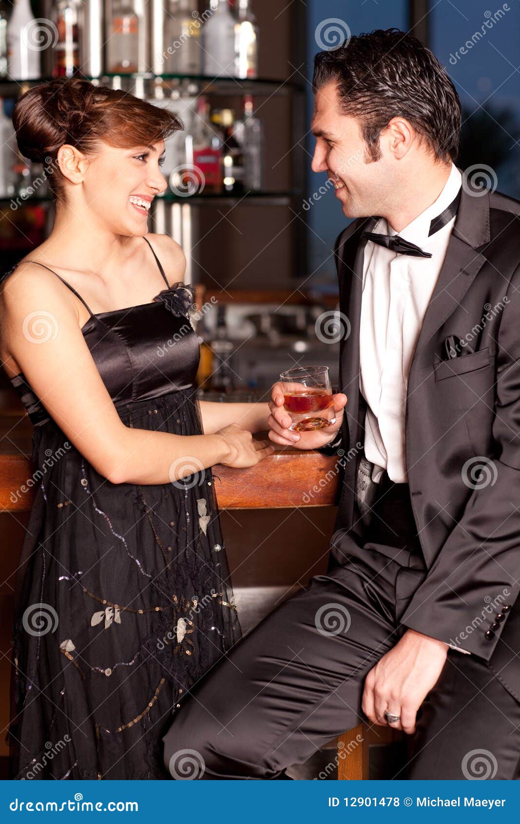 Young Couple at Bar Drinking and Flirting Stock Photo - Image of whisky ...
