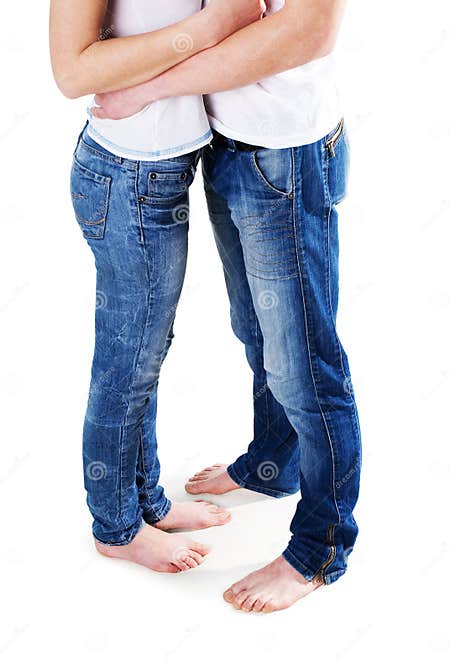 Young Couple Barefoot Legs Wearing Blue Jeans Isolated On White
