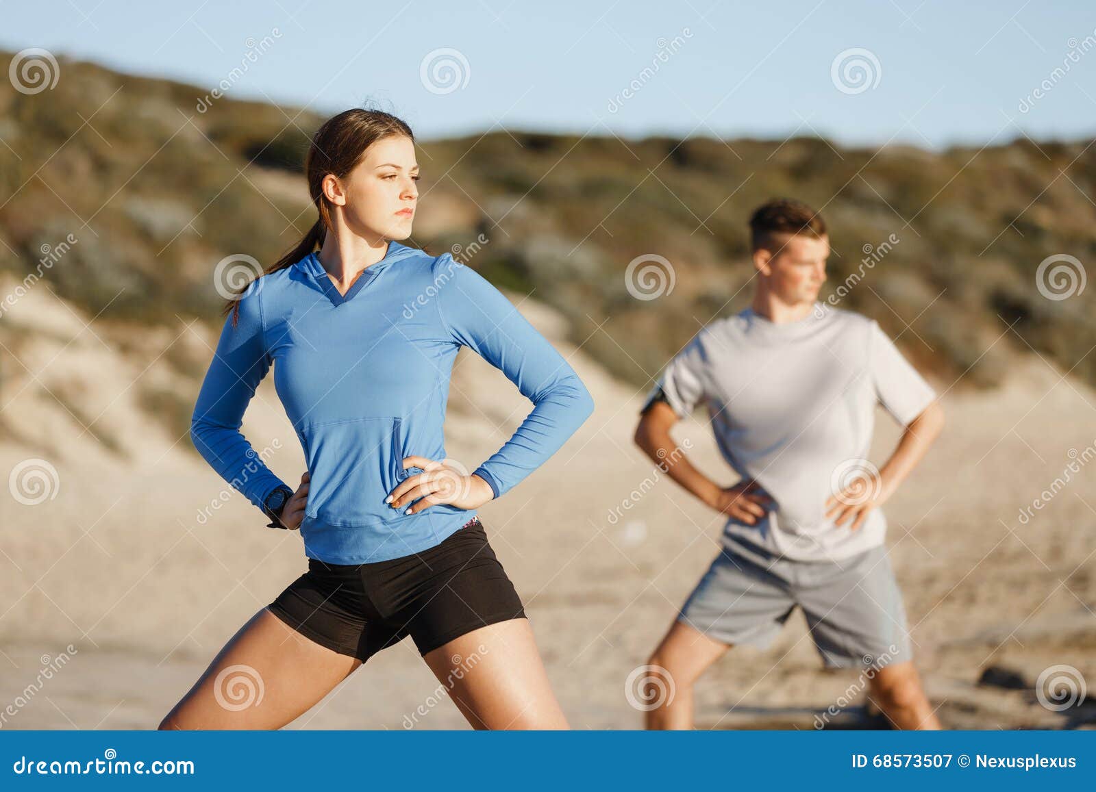 Young Couple on Beach Training Together Stock Image - Image of sand ...