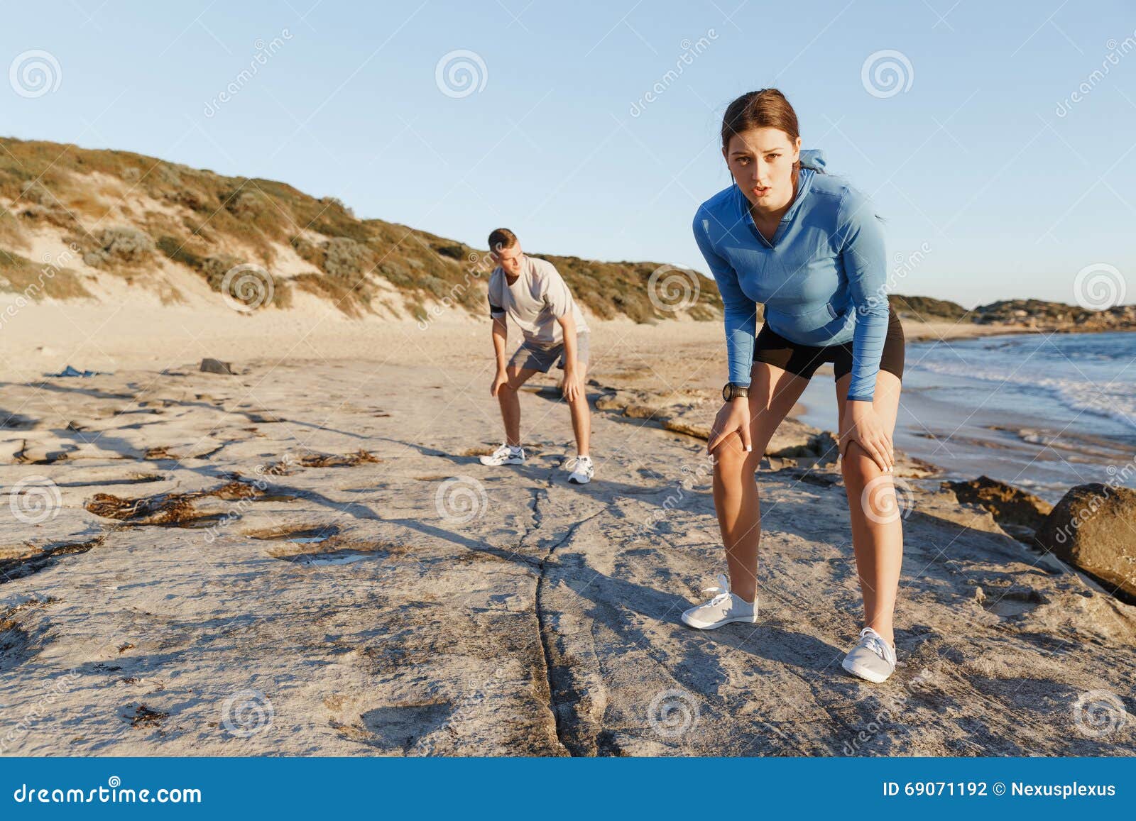 Young Couple on Beach Training Together Stock Photo - Image of runner ...