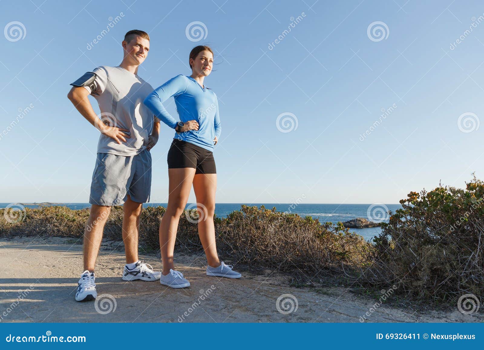 Young Couple on Beach Training Together Stock Image - Image of ocean ...