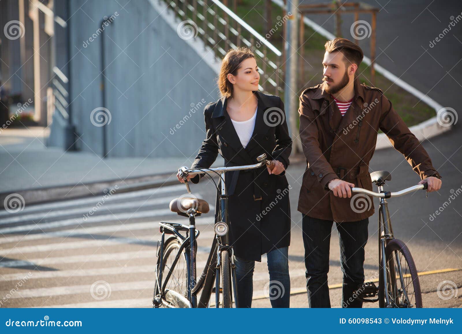 Young Couple with on a Bicycle Opposite City Stock Image - Image of ...