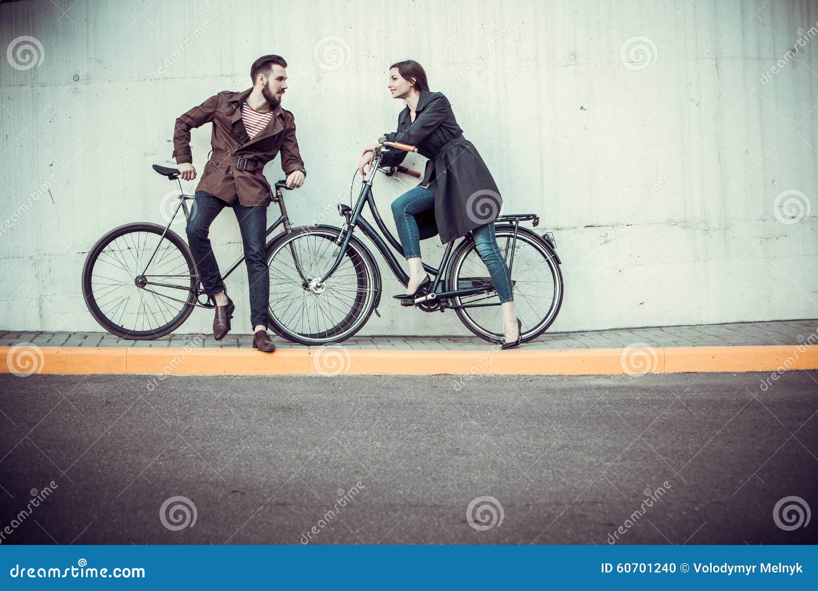 Young Couple with a Bicycle Opposite City Stock Photo - Image of loving ...