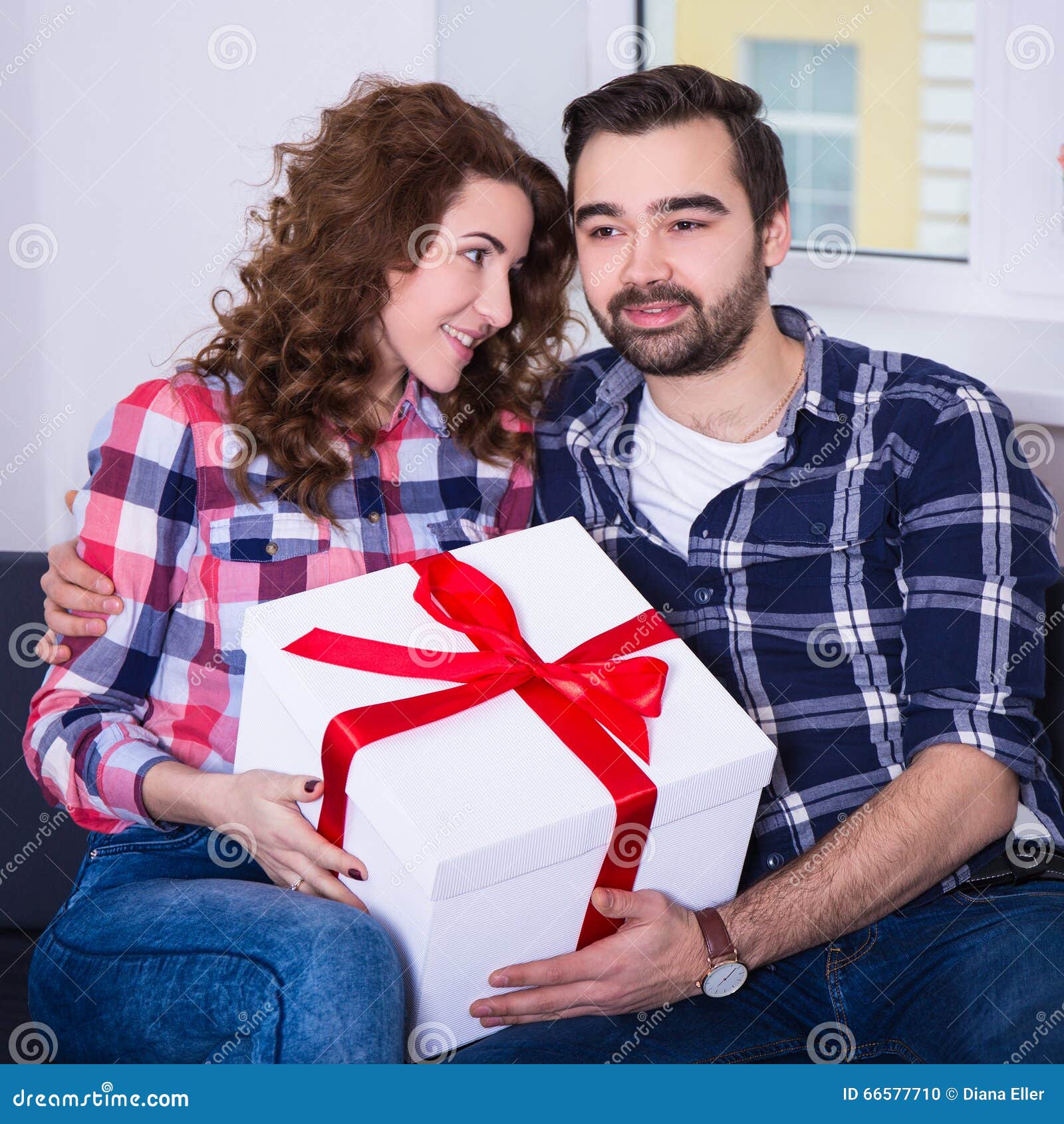 Young Couple with Big Gift Box Stock Photo - Image of indoor, girl ...
