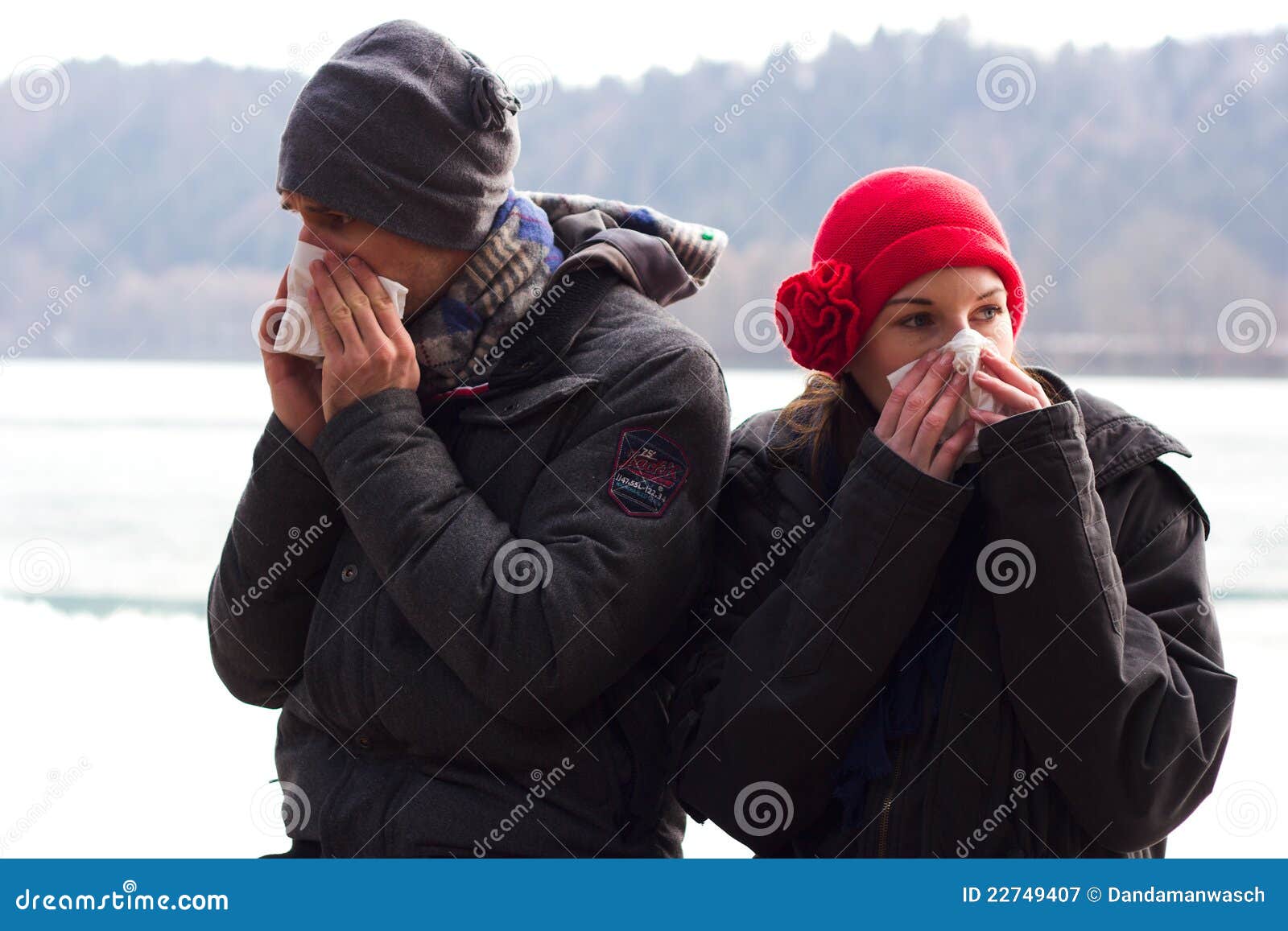 A Young Couple Blowing Their Noses Stock Image - Image of adult, beanie ...
