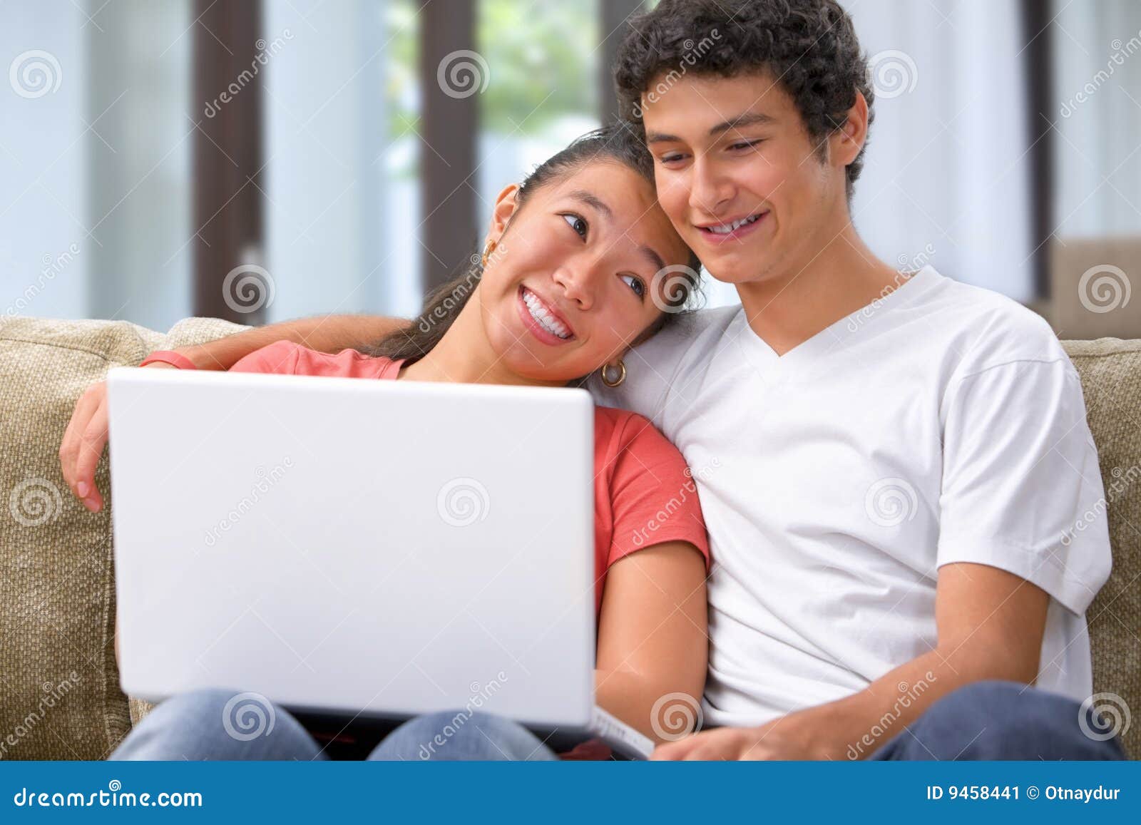 Young Couple Browsing Internet at Home Stock Image - Image of together ...